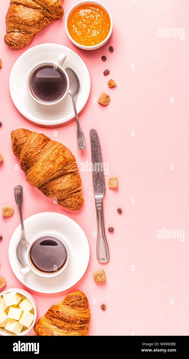 Coffee and croissants on pastel background, top view Stock Photo - Alamy