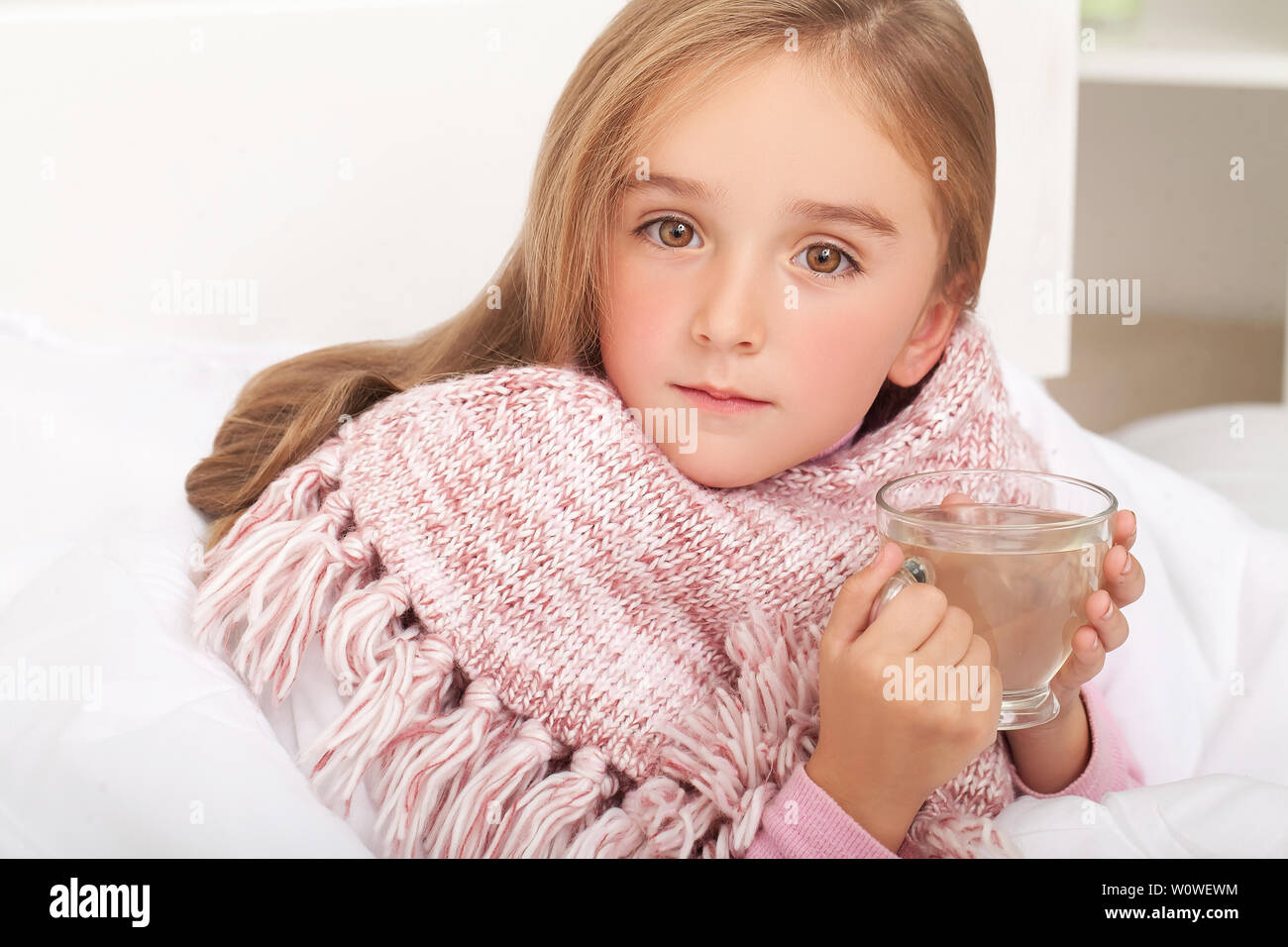 Fever, cold and flu - Medicines and hot tea in near, sick girl in bed ...