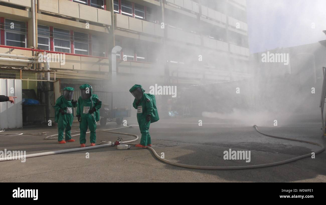 Firefighters connect water pipes, create wall of water during a drill ...