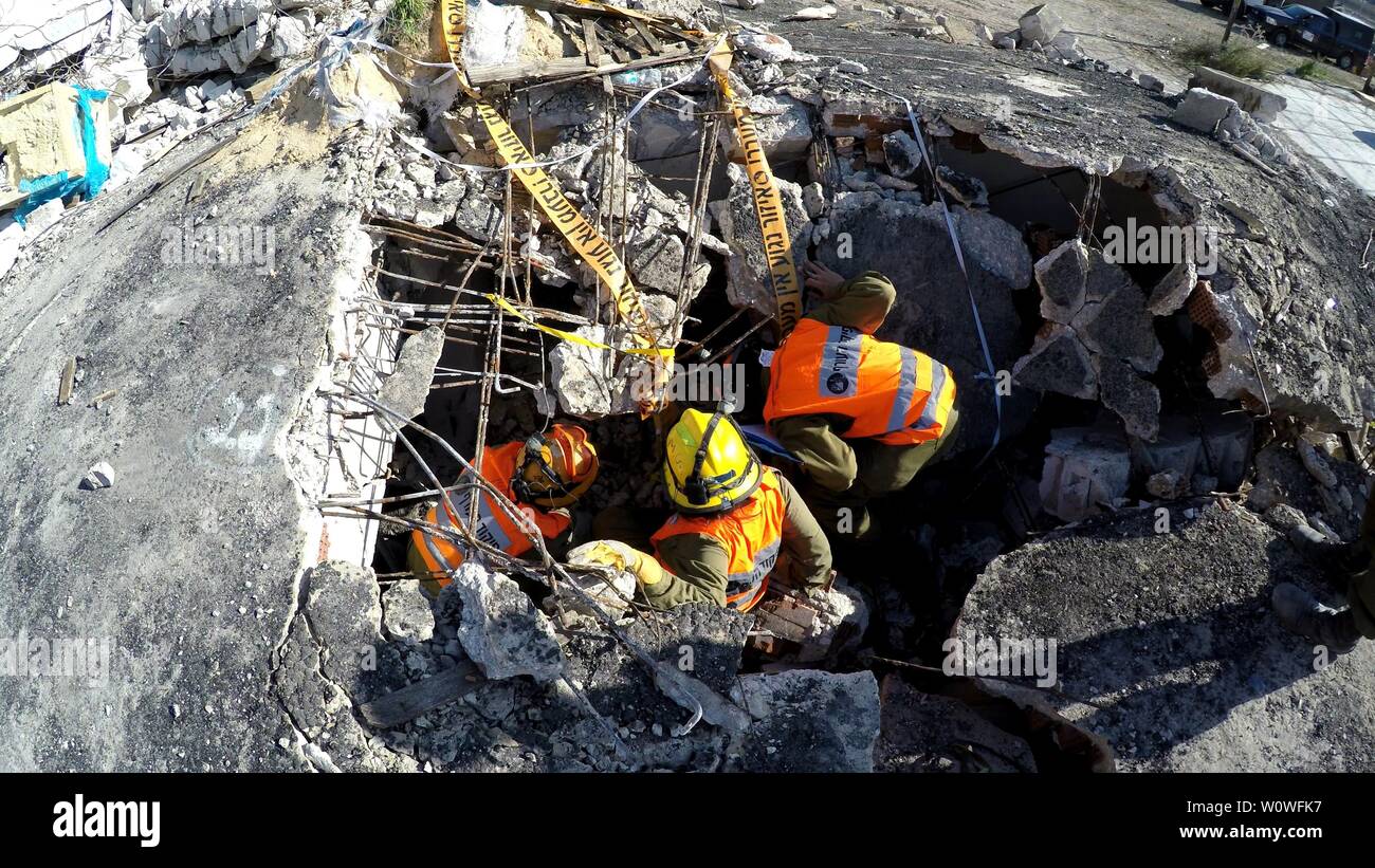 Israeli Homeland Security Soldiers break concrete and rescue injured ...