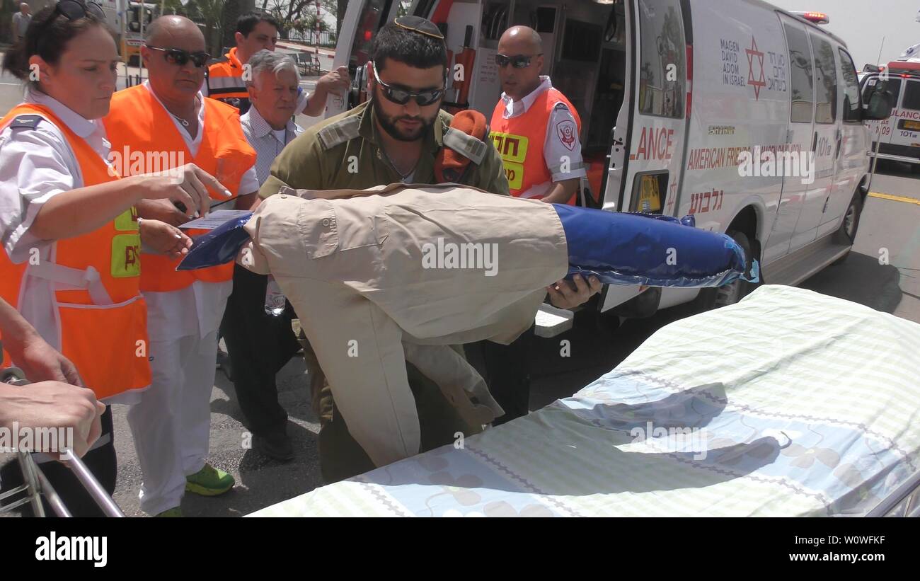 Paramedics unload from ambulance injured mannequins victims of ...