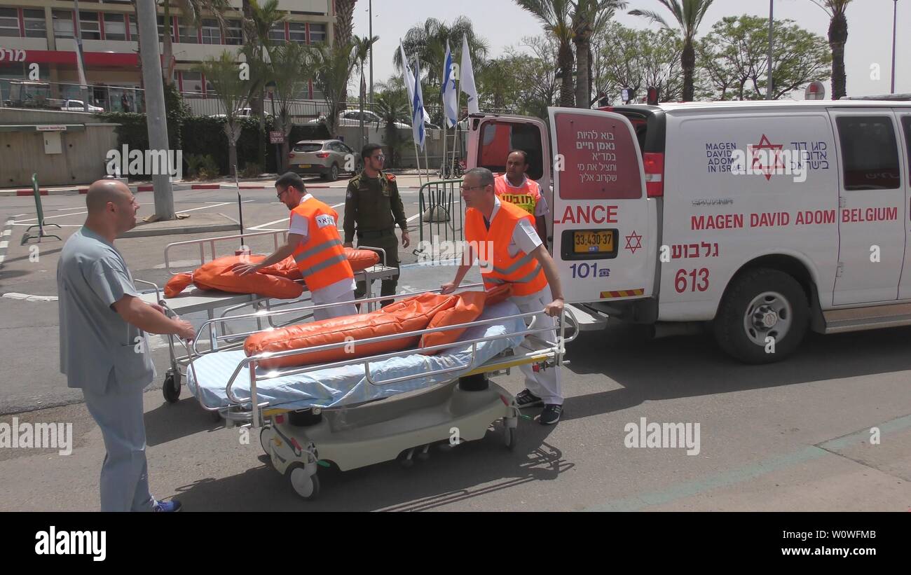 Paramedics unload from ambulance injured mannequins victims of ...