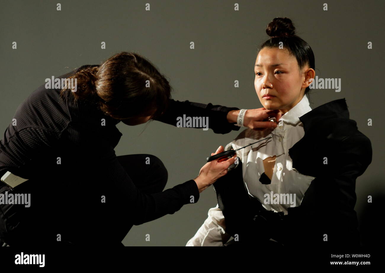 Yoko ono cut piece hi-res stock photography and images - Alamy