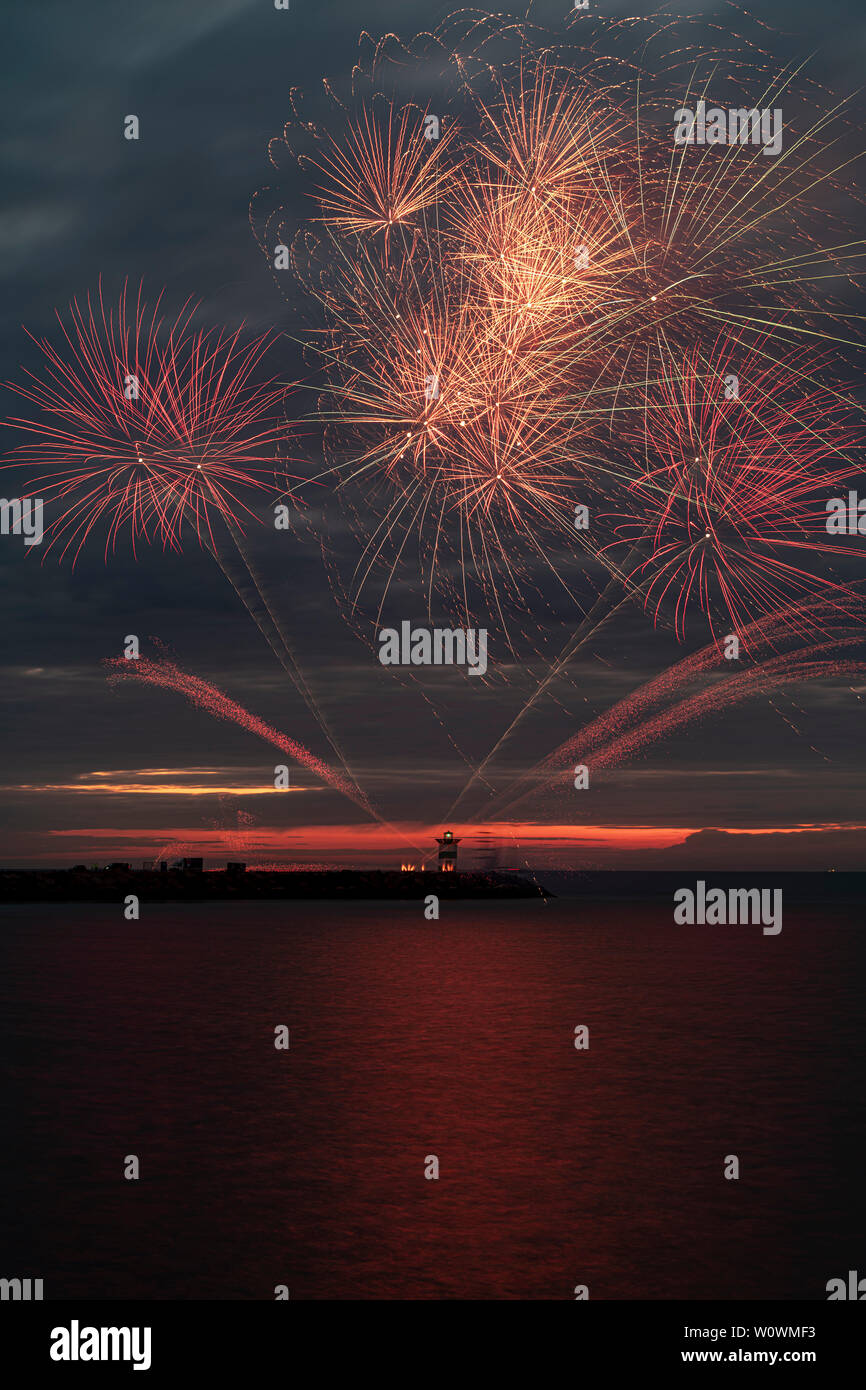 Fireworks launch at the pier of the Scheveningen harbor celebrating the ...