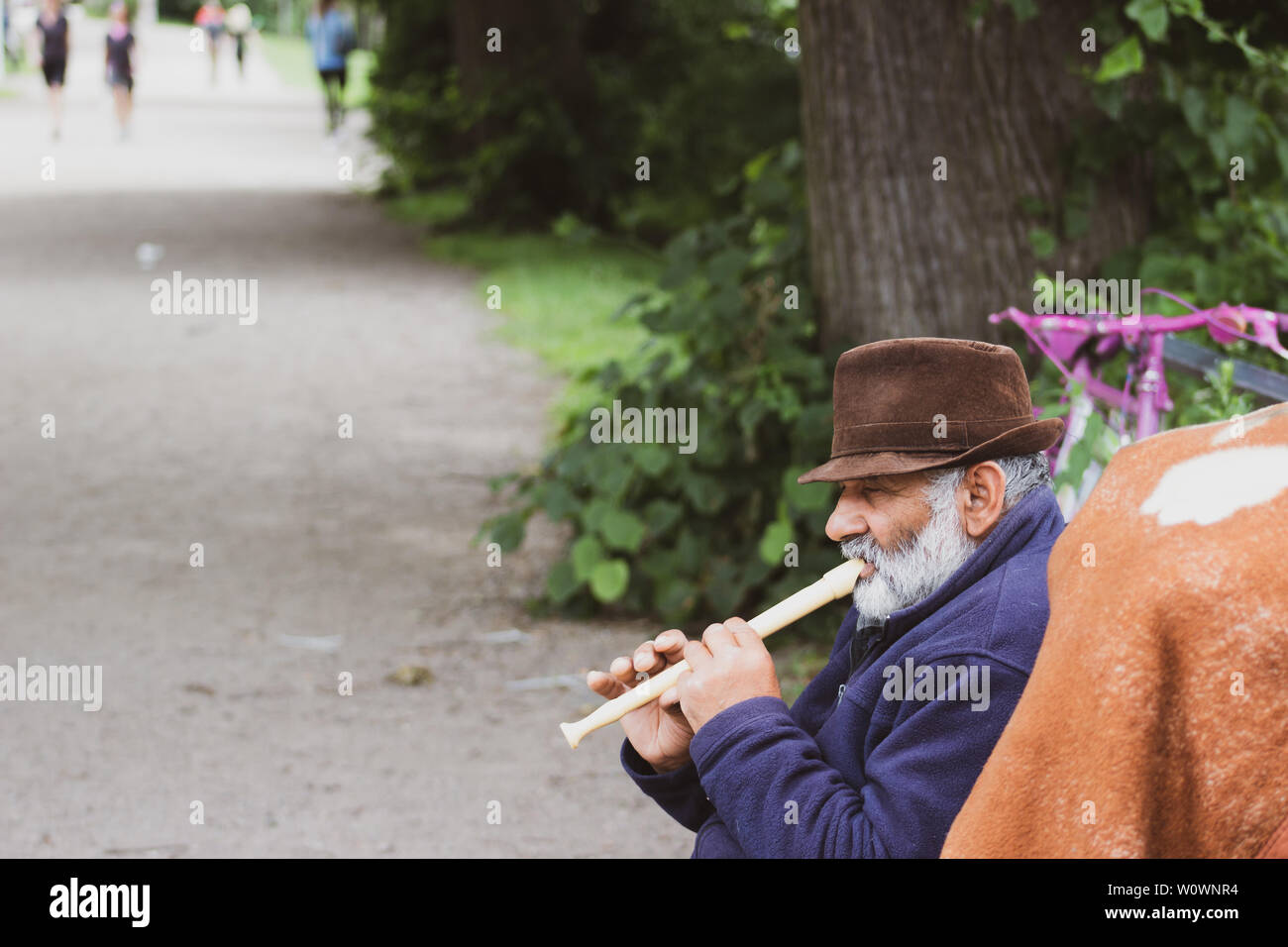Street Musician Playing Flute High Resolution Stock Photography and ...