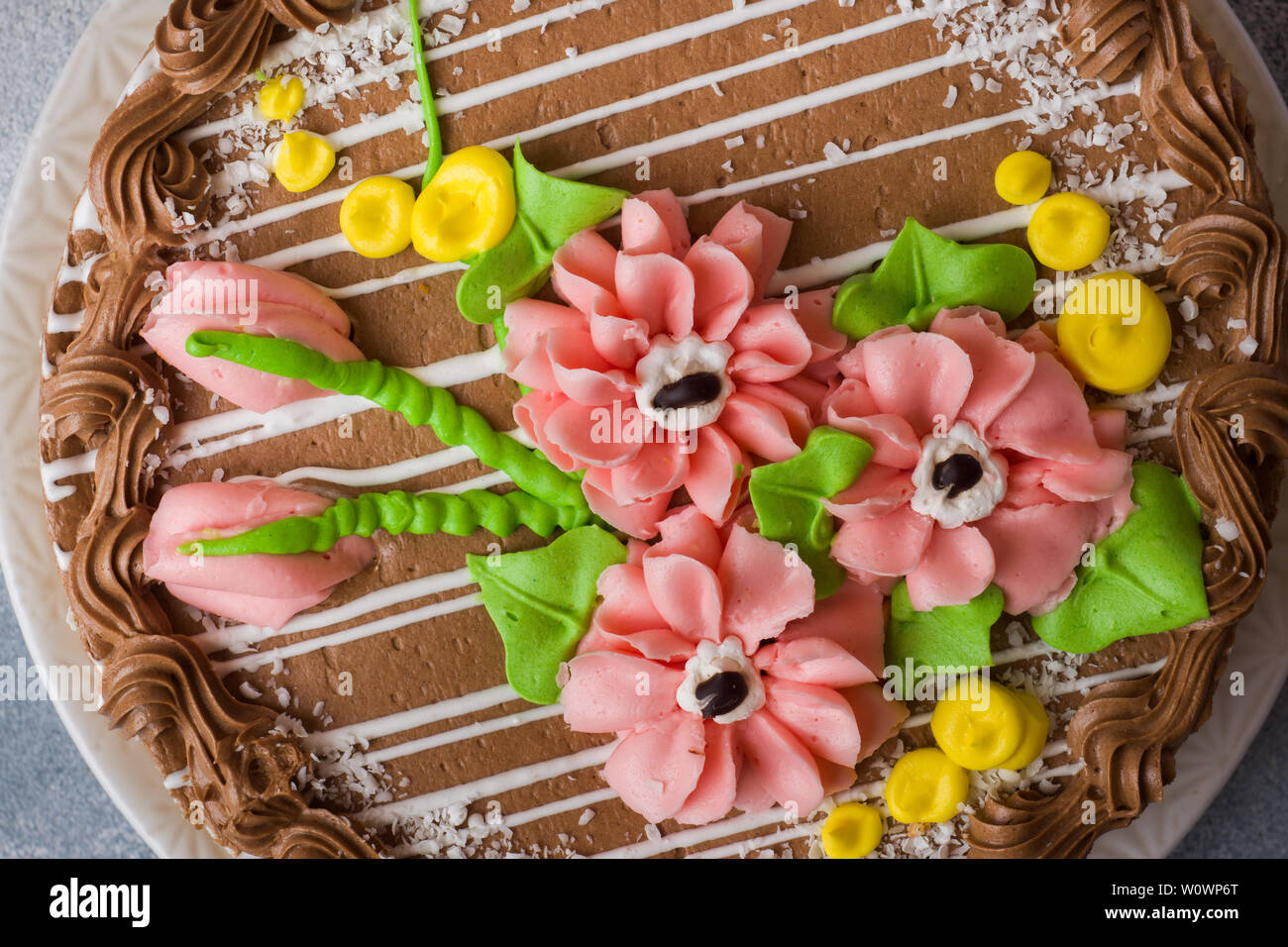 Beautiful meringue cake decorated with cream roses. Sweet food ...