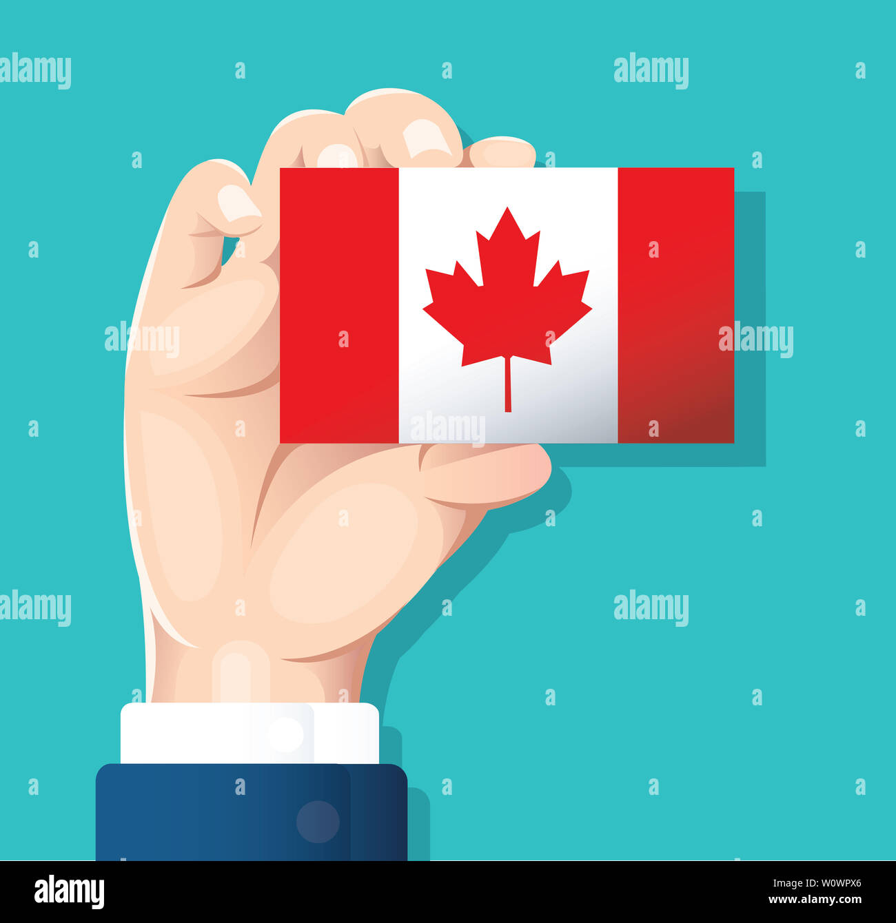 hand holding Canada flag card with blue background Stock Photo - Alamy