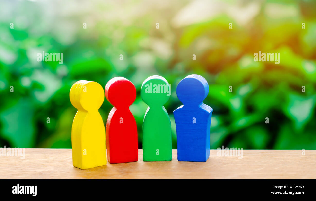 Four colorful figures of people talking. International cooperation ...
