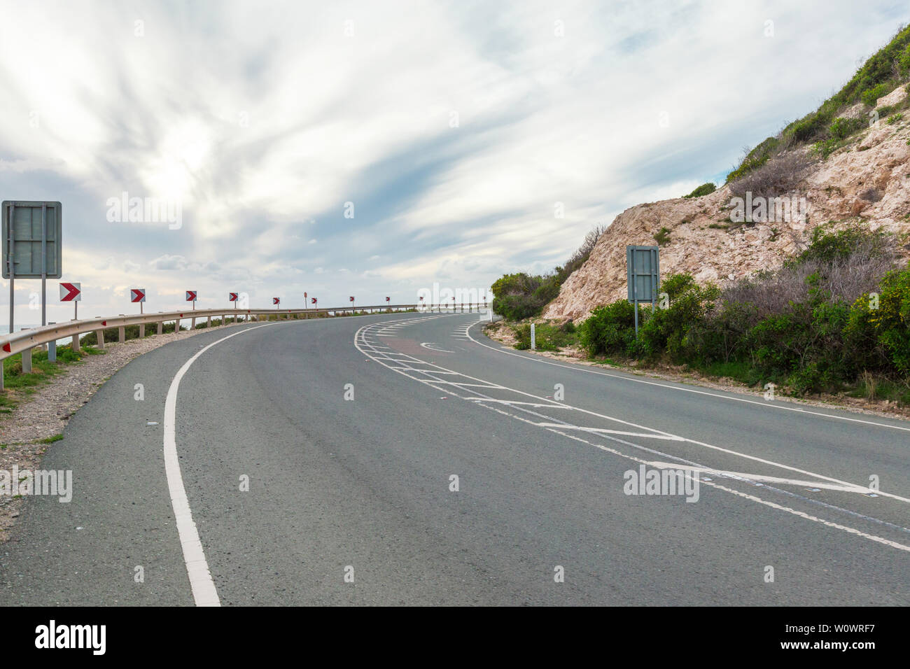 Driving on an empty road Stock Photo - Alamy