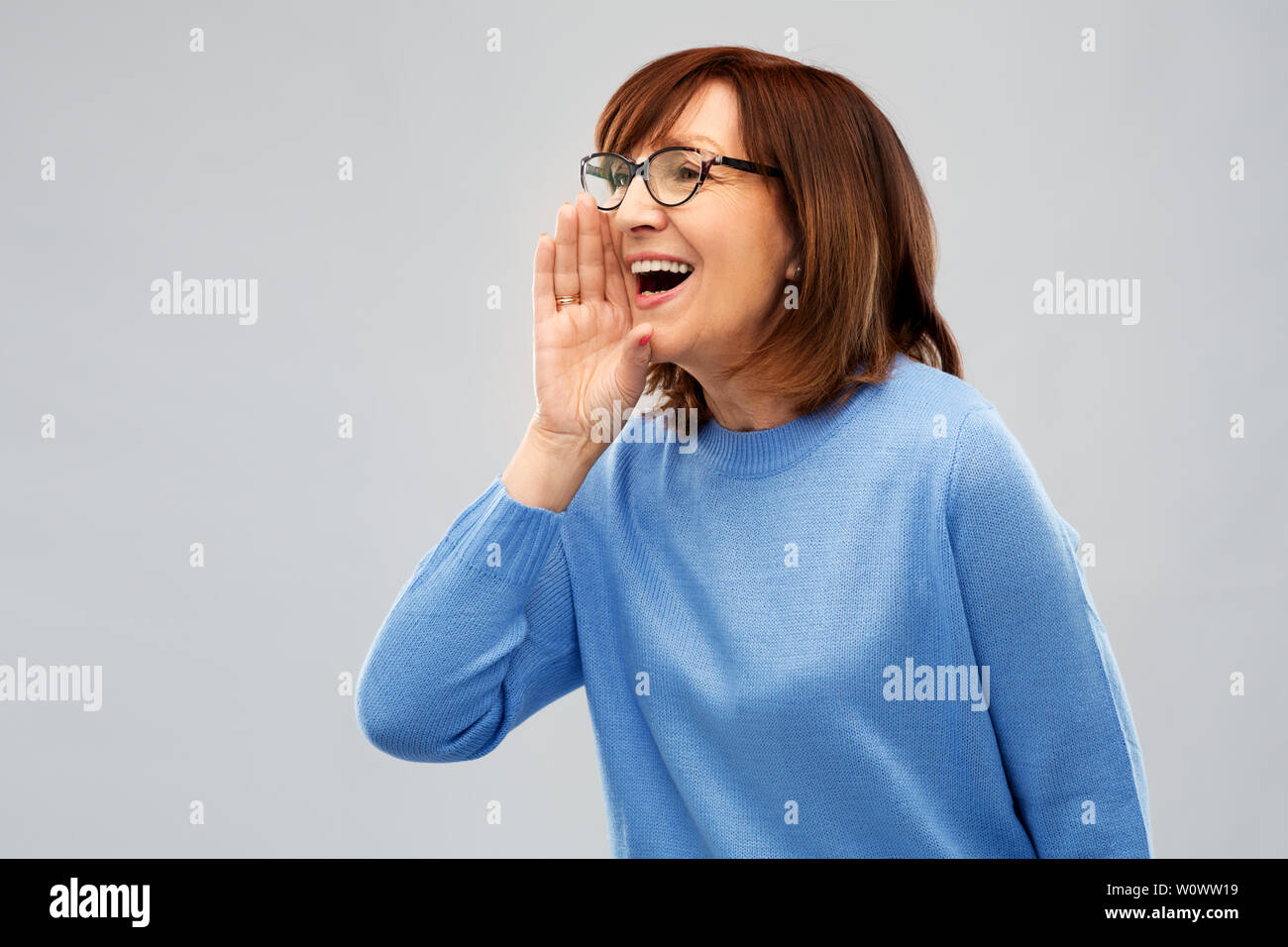 Woman hand over mouth mature hi-res stock photography and images - Alamy