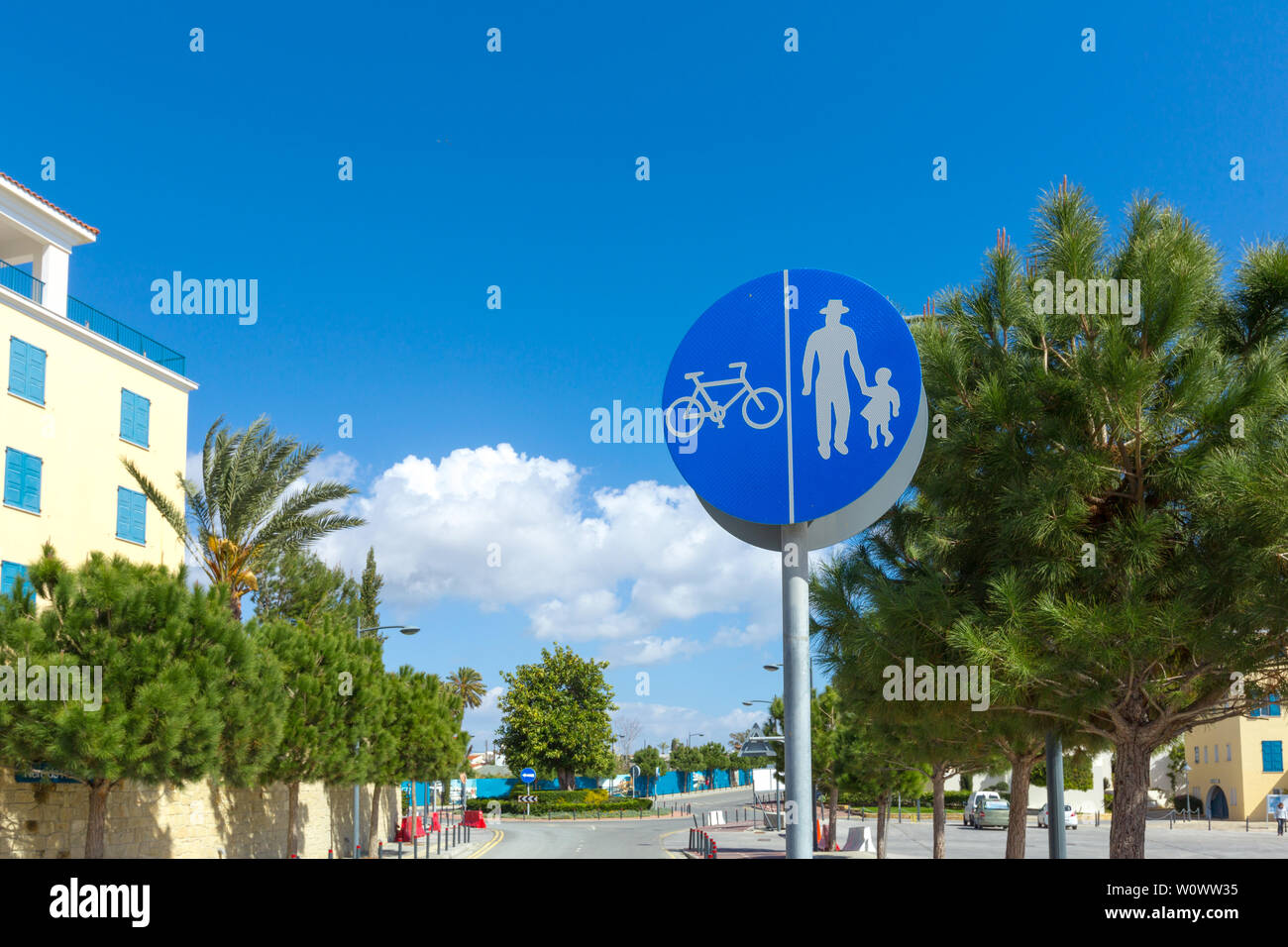 Bicycle lane signage on street Stock Photo - Alamy