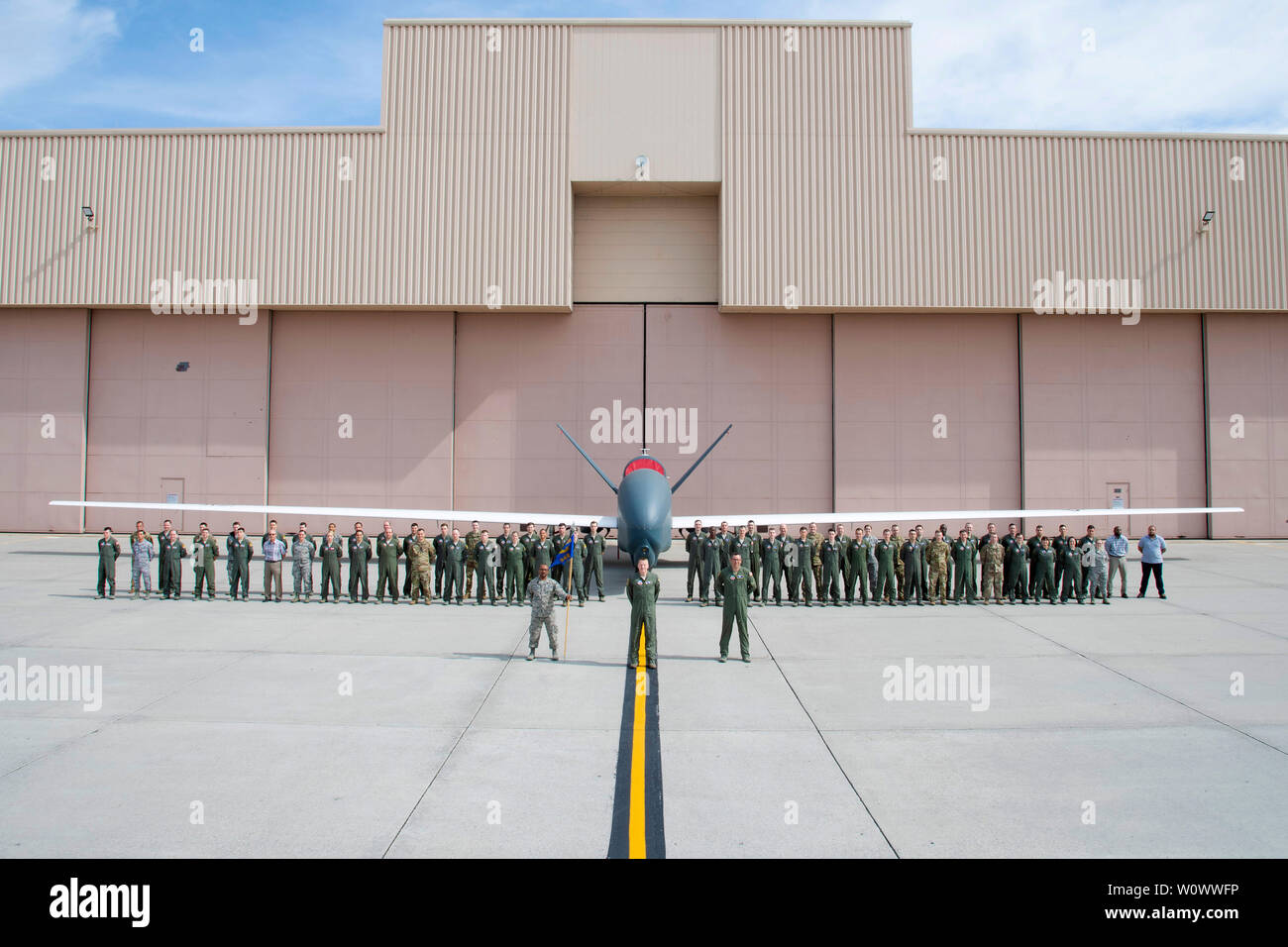 Members with the 348th Reconnaissance Squadron stand for a photo in ...