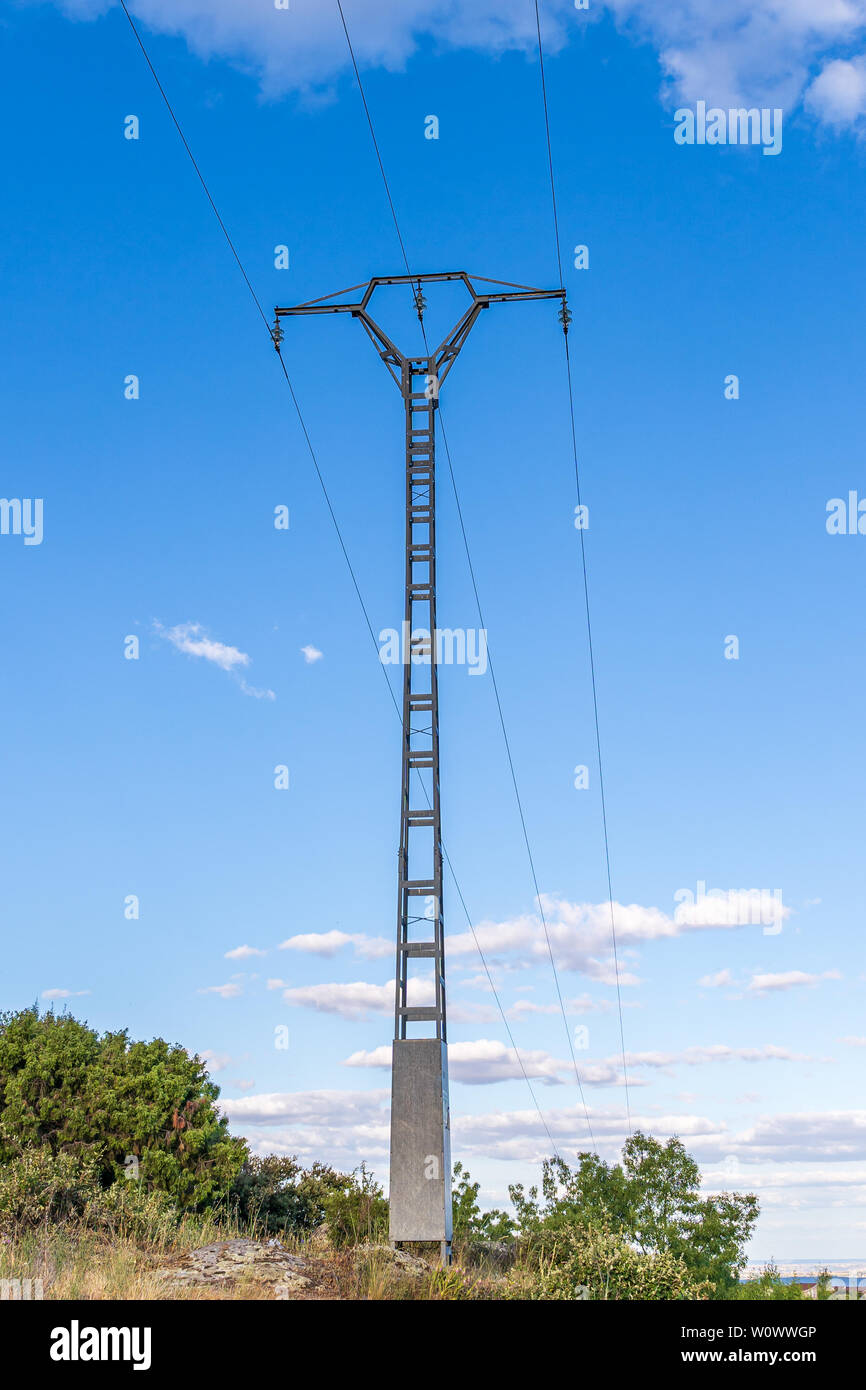 Small high voltage tower in the countryside Stock Photo - Alamy