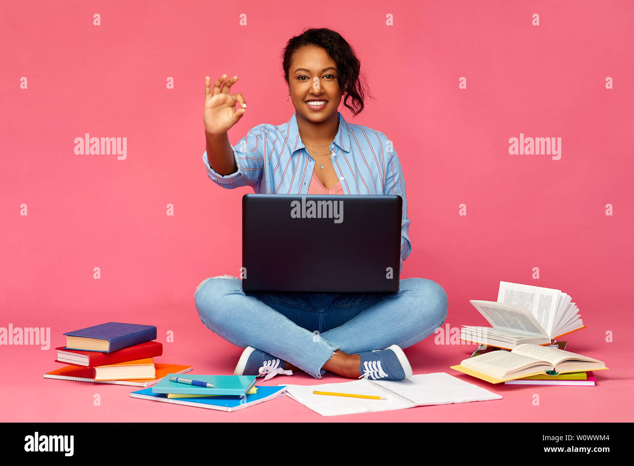 happy african american student woman with laptop Stock Photo - Alamy