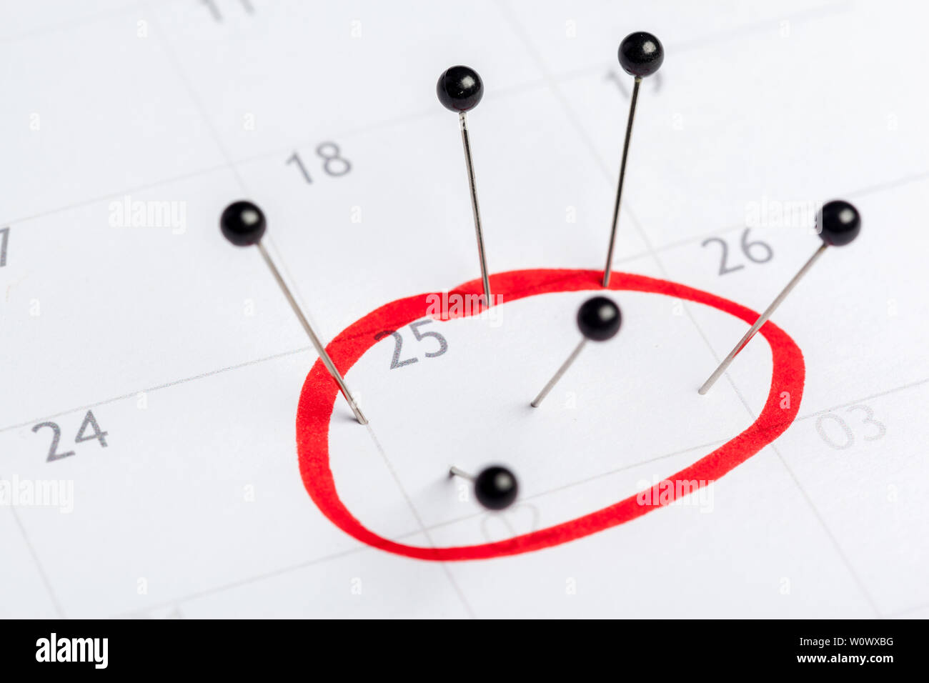Closeup of dates on calendar page Stock Photo - Alamy