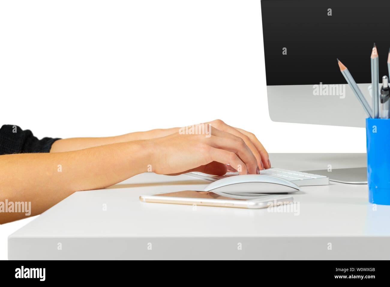 Woman hands working with computer keyboard isolated on white background ...