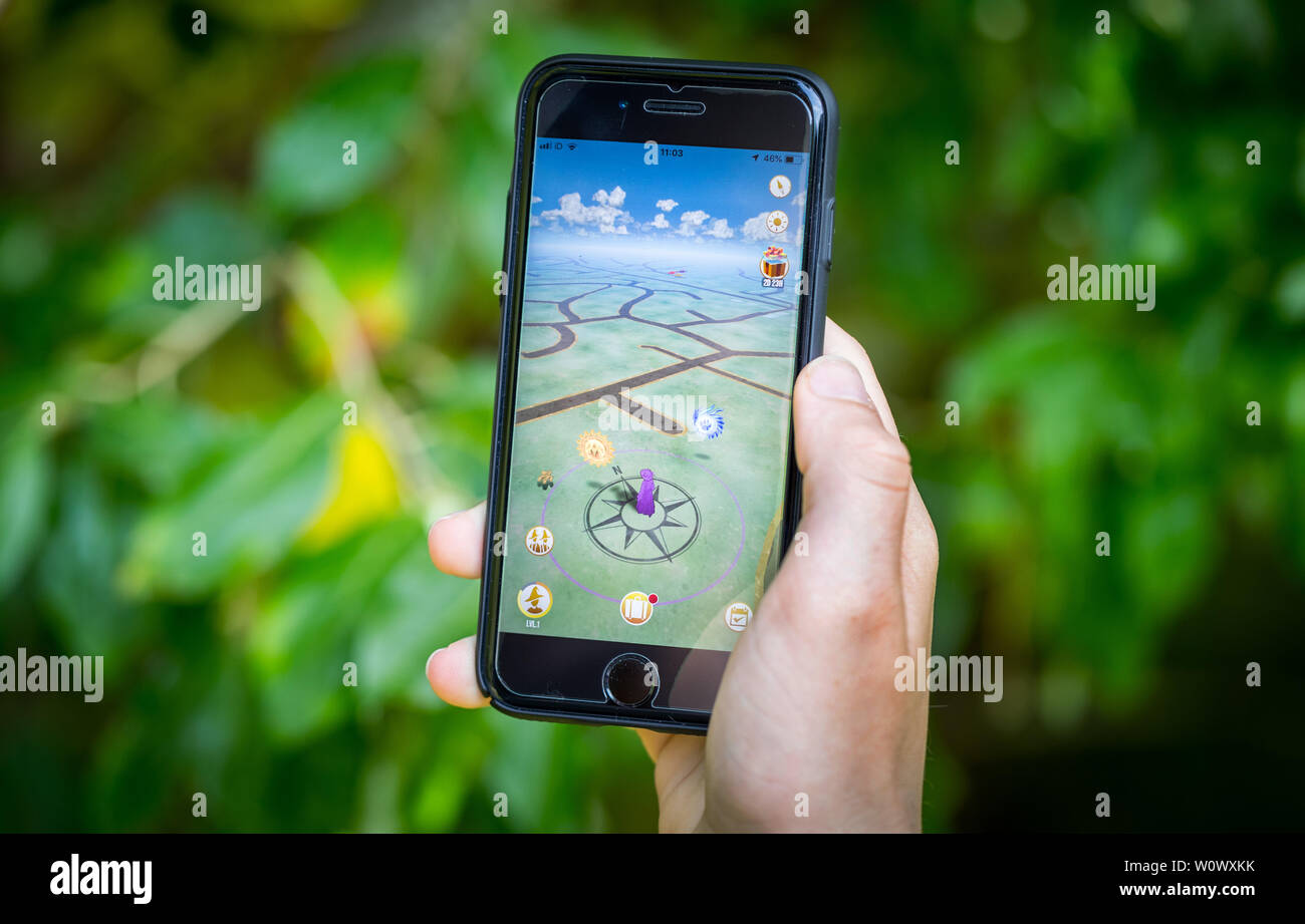 A teenage boy playing the new Harry Potter Wizards Unite App on his ...