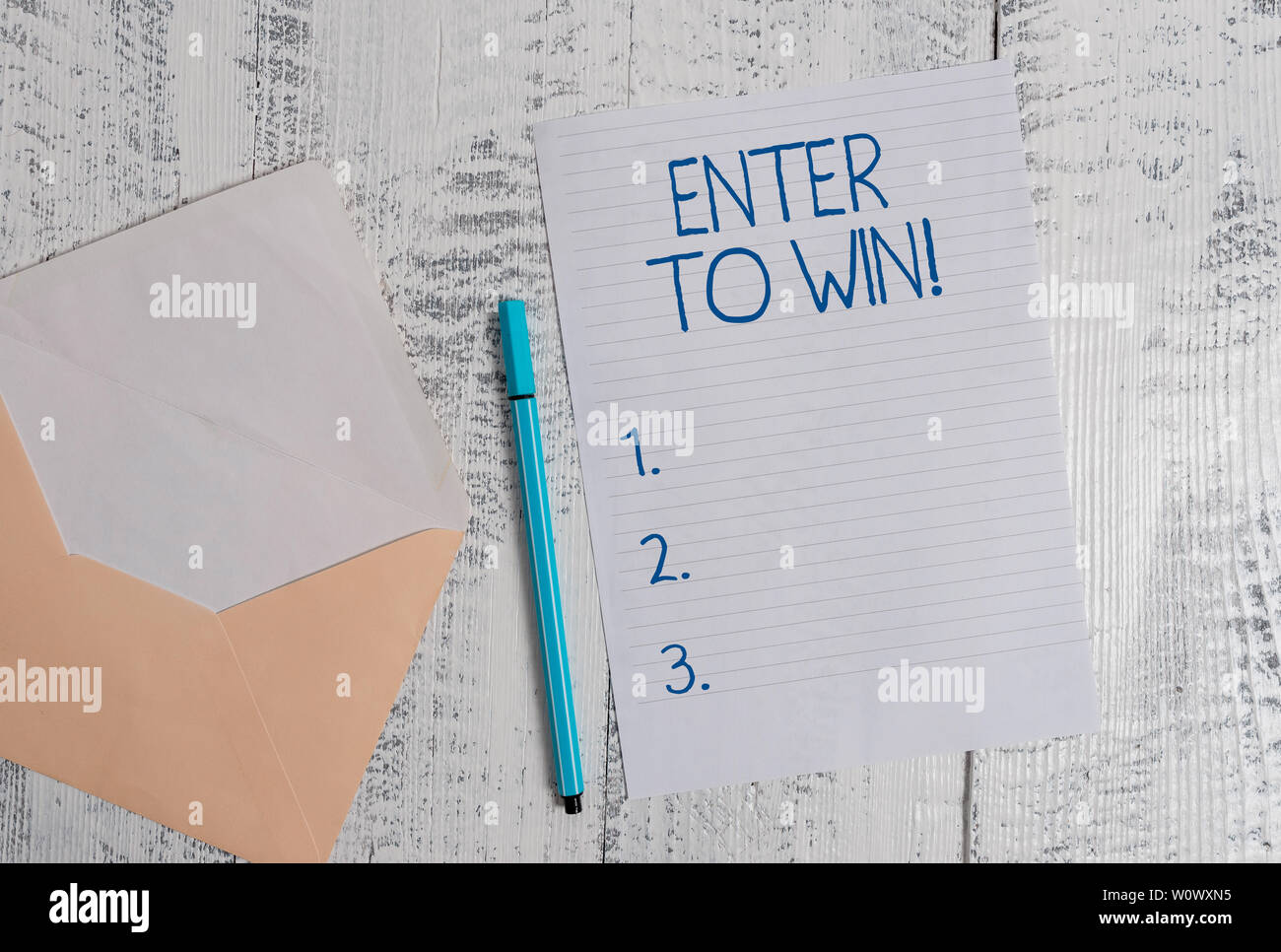 Award envelope hand hi-res stock photography and images - Alamy