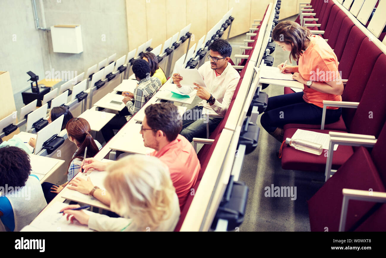 group of students writing test at lecture hall Stock Photo - Alamy