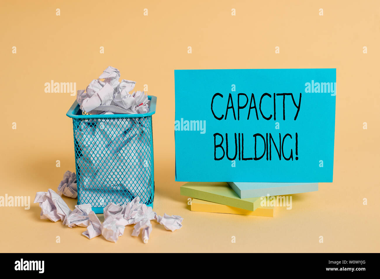 Writing note showing Capacity Building. Business concept for Strengthen ...