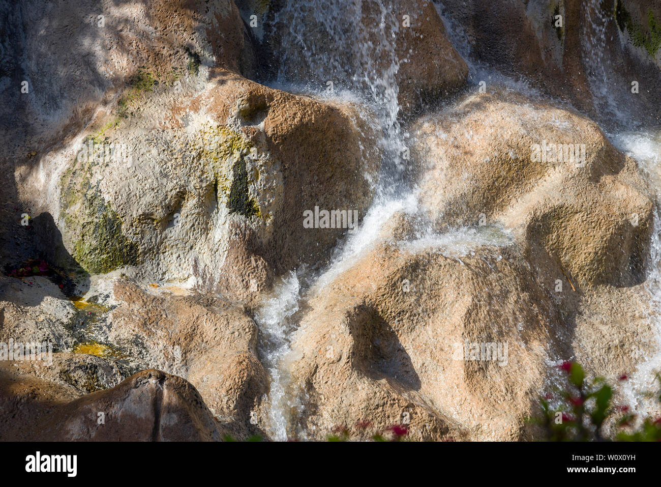 Soft water flows over rocks hi-res stock photography and images - Alamy