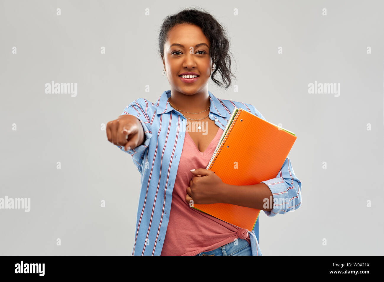 african american student woman with notebooks Stock Photo - Alamy