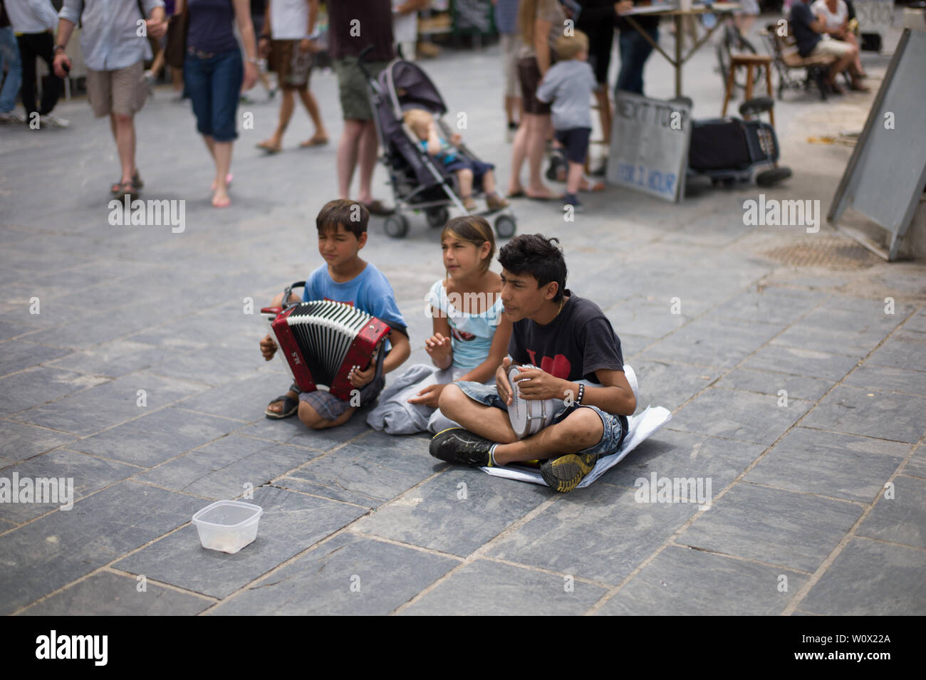 Child begging in streets hi-res stock photography and images - Alamy