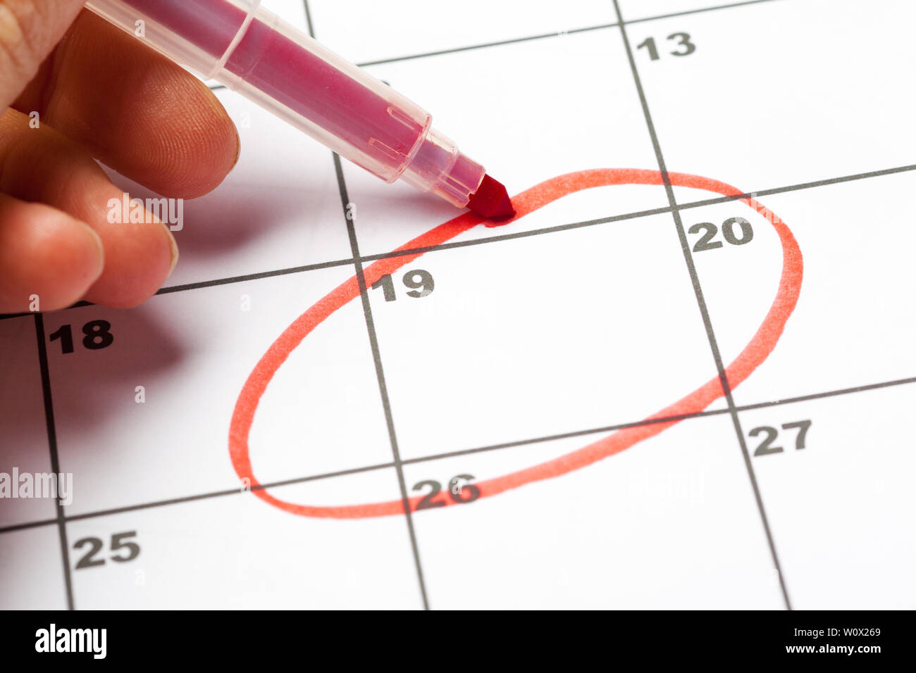 Closeup of dates on calendar page Stock Photo - Alamy