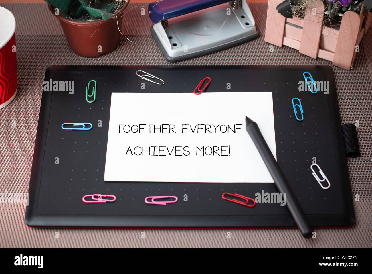 Conceptual hand writing showing Together Everyone Achieves More ...