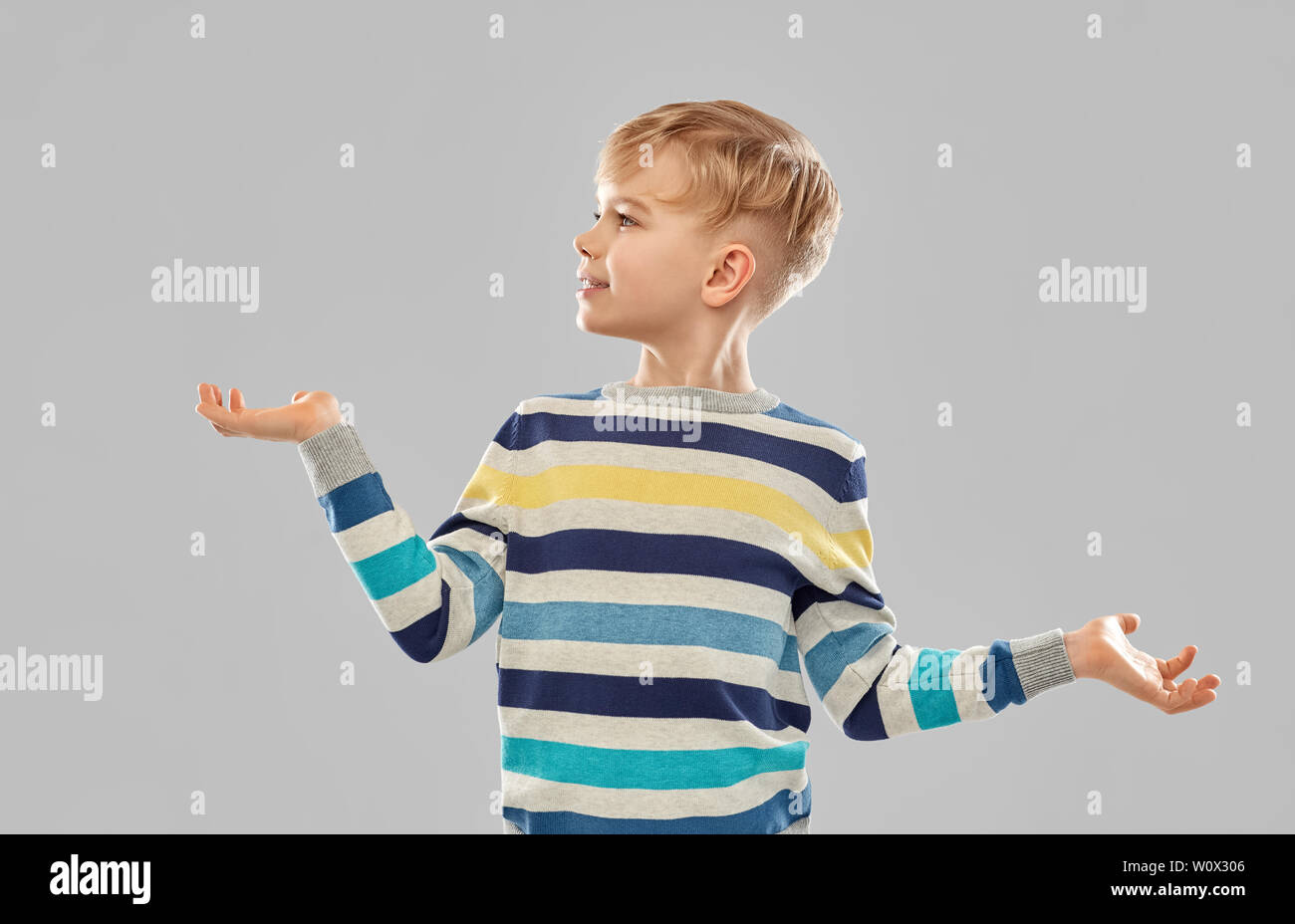 Boy holding something hi-res stock photography and images - Alamy