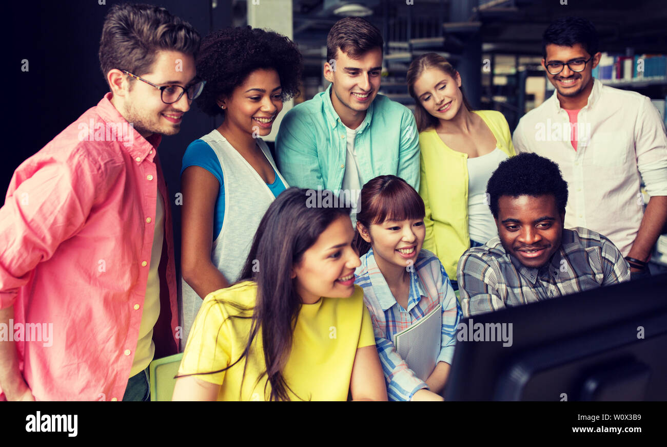 international students with computers at library Stock Photo - Alamy