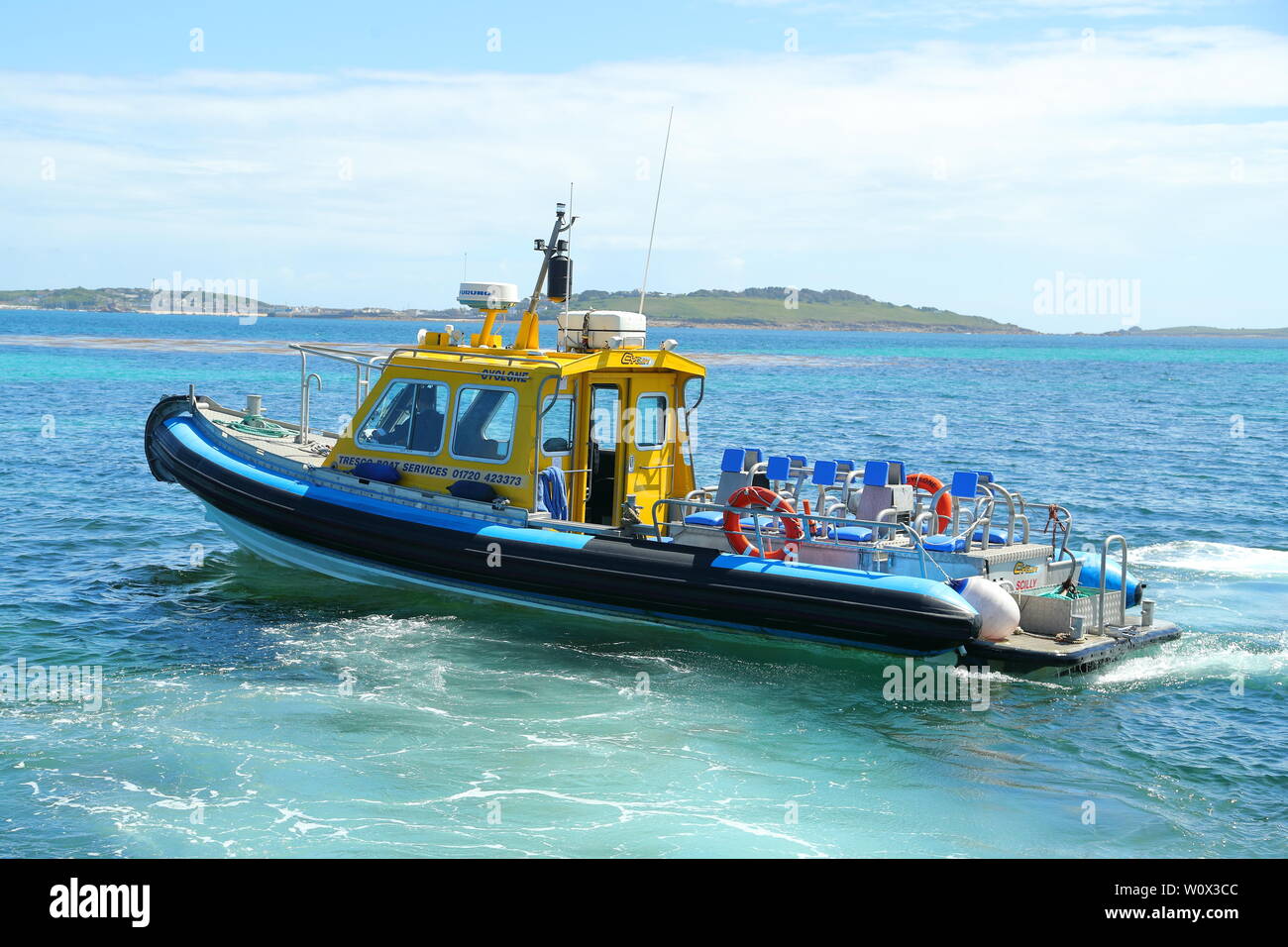 The Cyclone ferry boat departing from Tresco, Isles of Scilly, Cornwall ...
