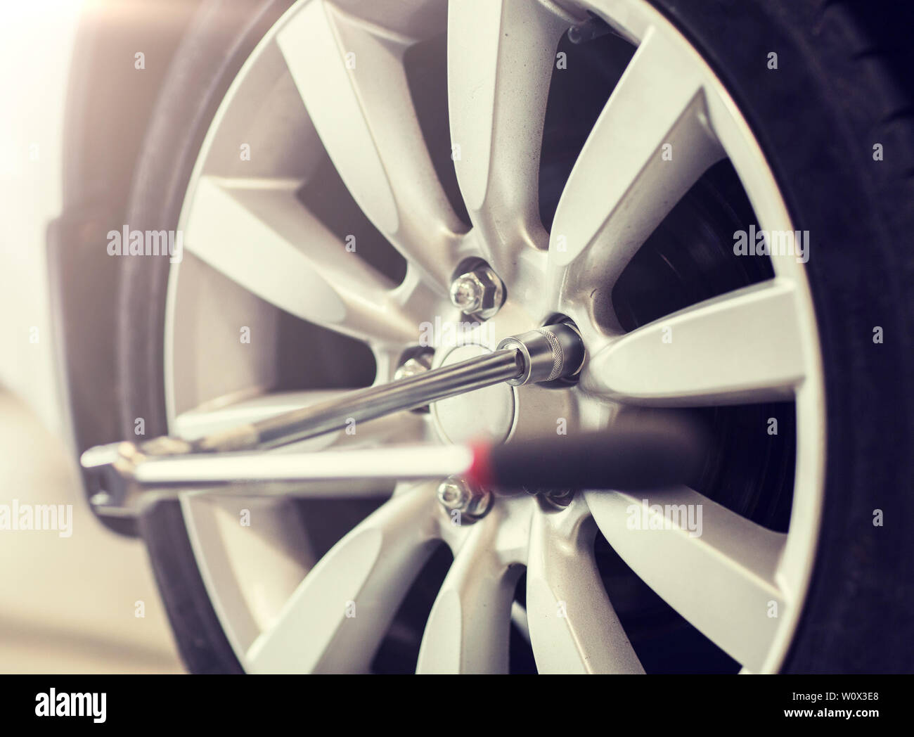 screwdriver and car wheel tire Stock Photo - Alamy
