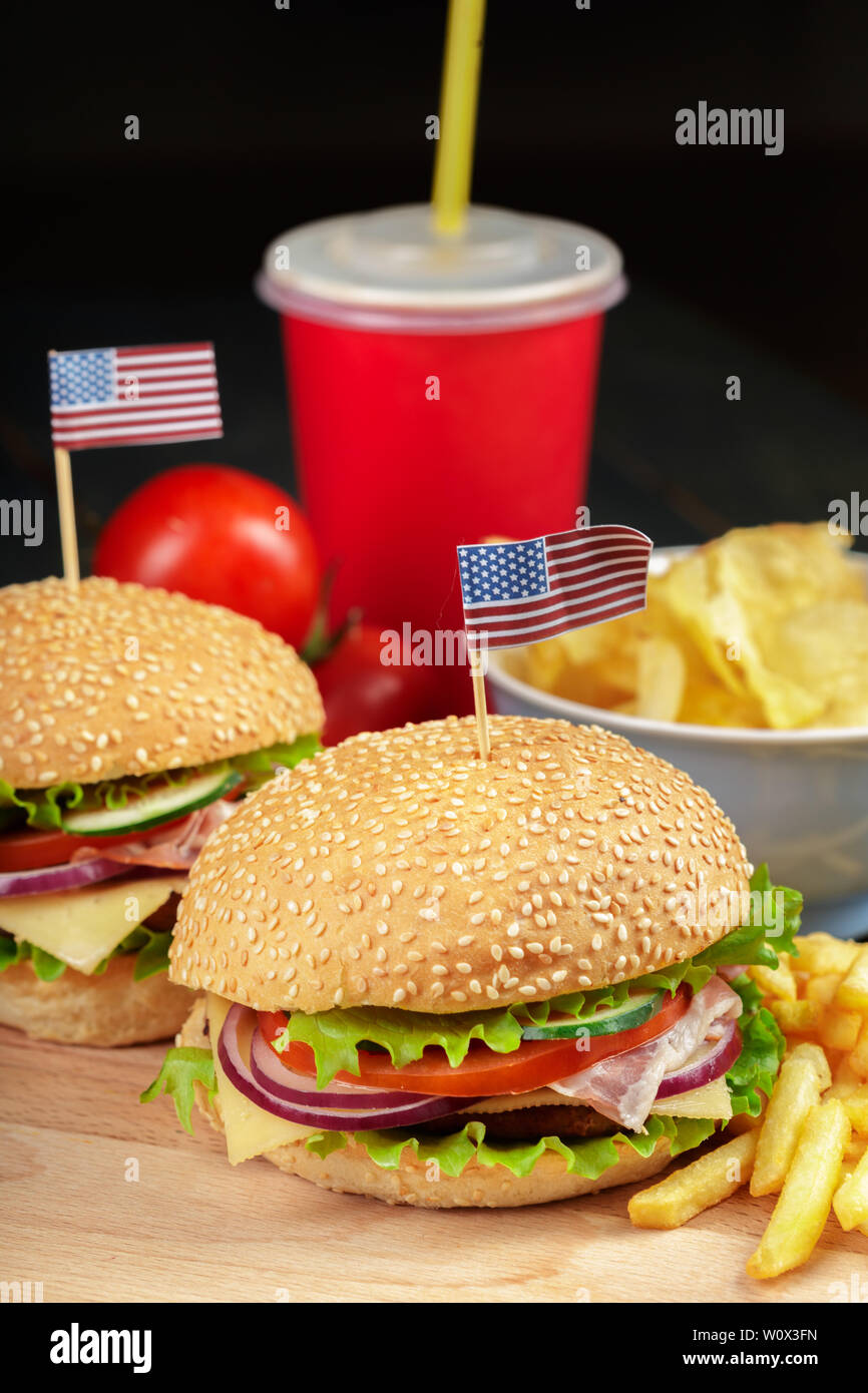 Fast food, homemade burger on a wooden background Stock Photo - Alamy