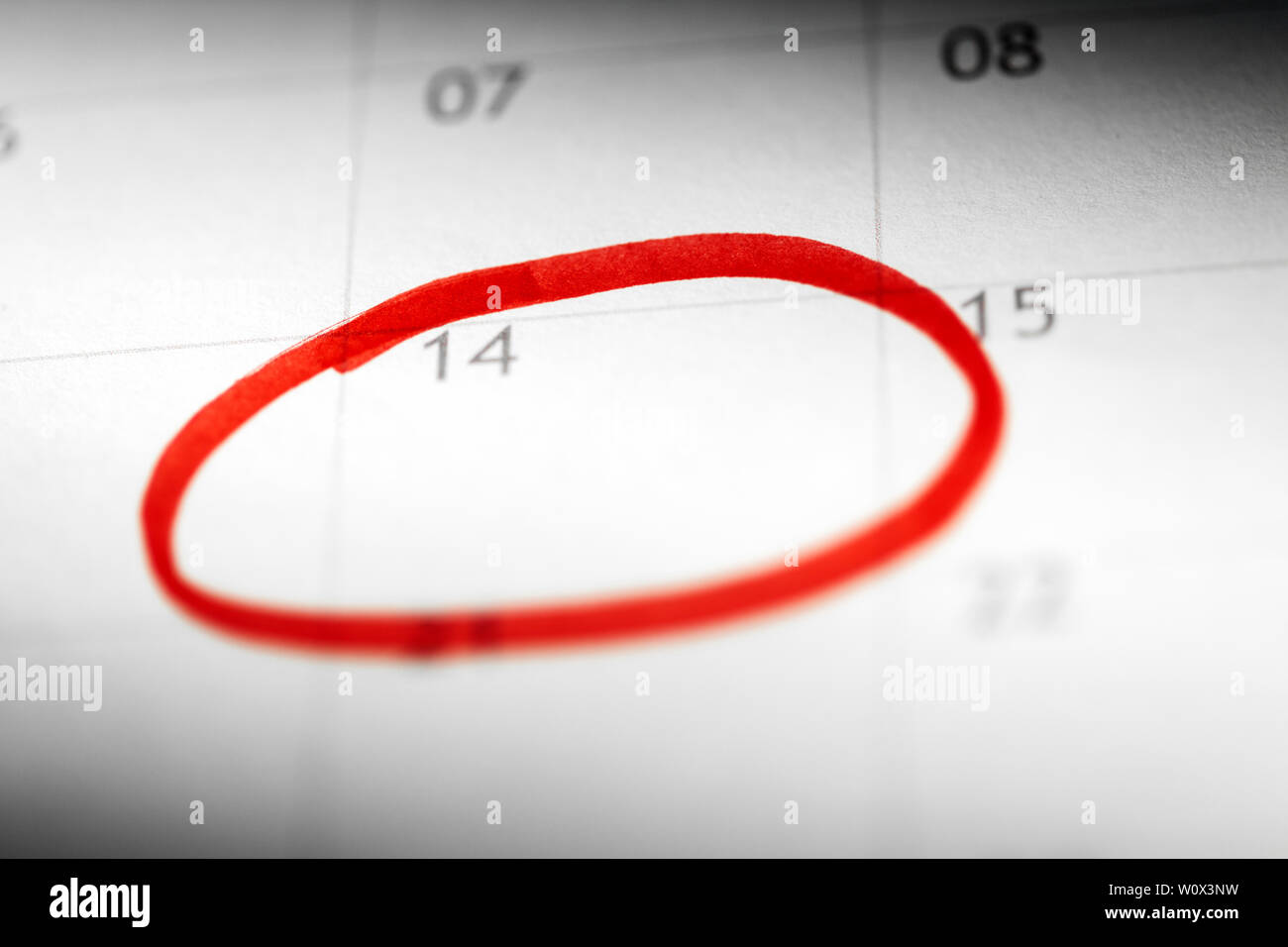 Closeup of dates on calendar page Stock Photo - Alamy