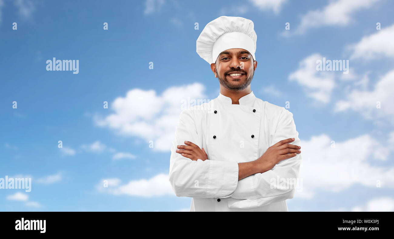 happy male indian chef in toque Stock Photo - Alamy