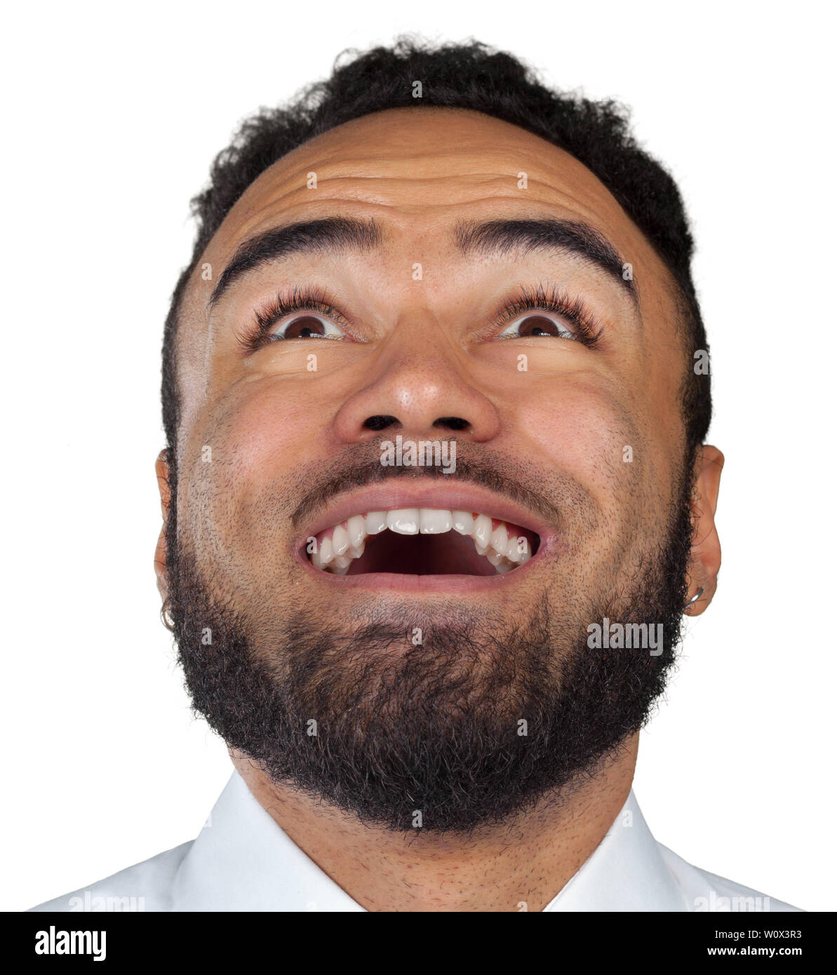 Close up portrait of a black man expressing surprise isolated on white ...