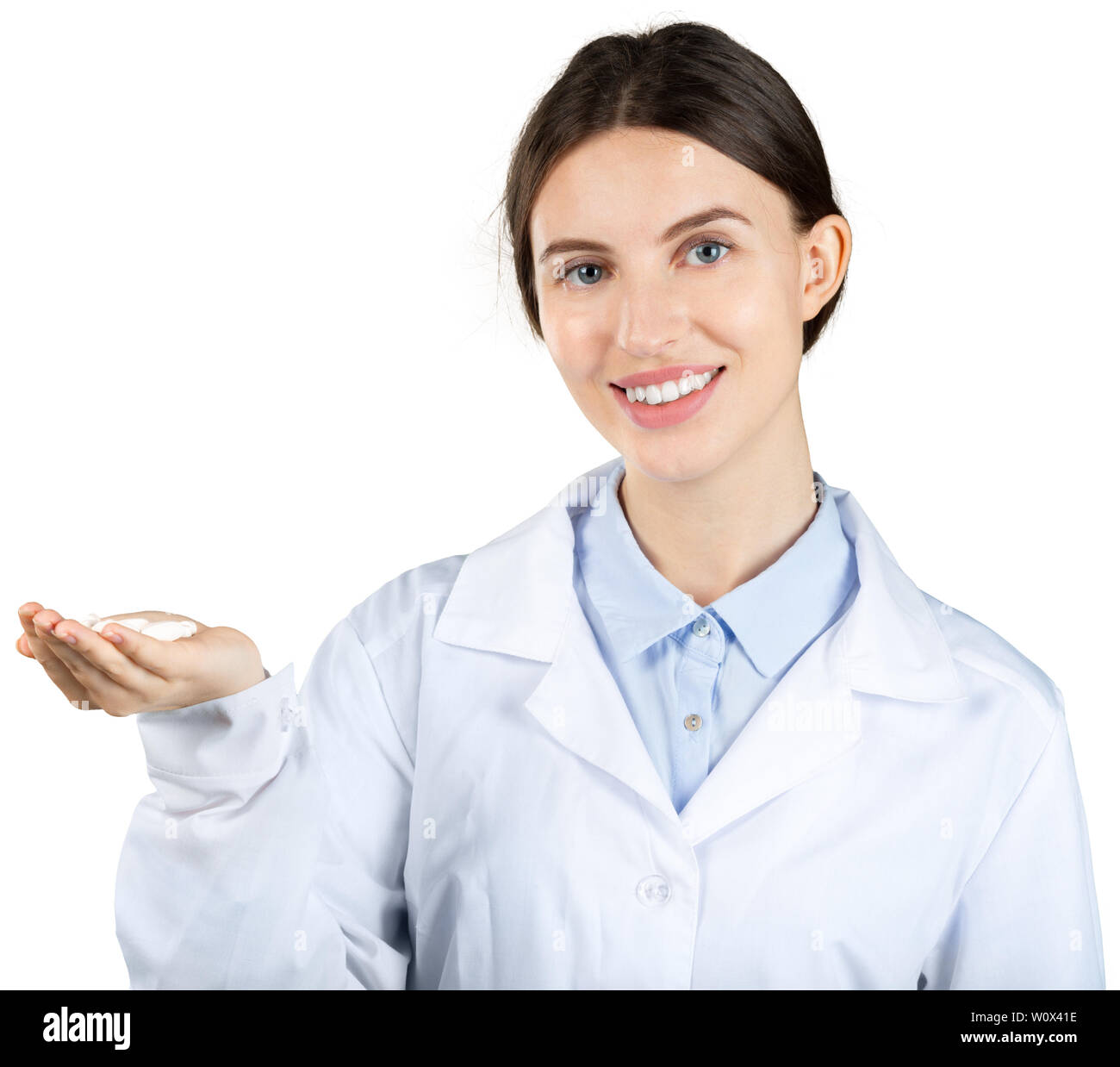 Young woman doctor making presentation of a medicine isolated on white ...