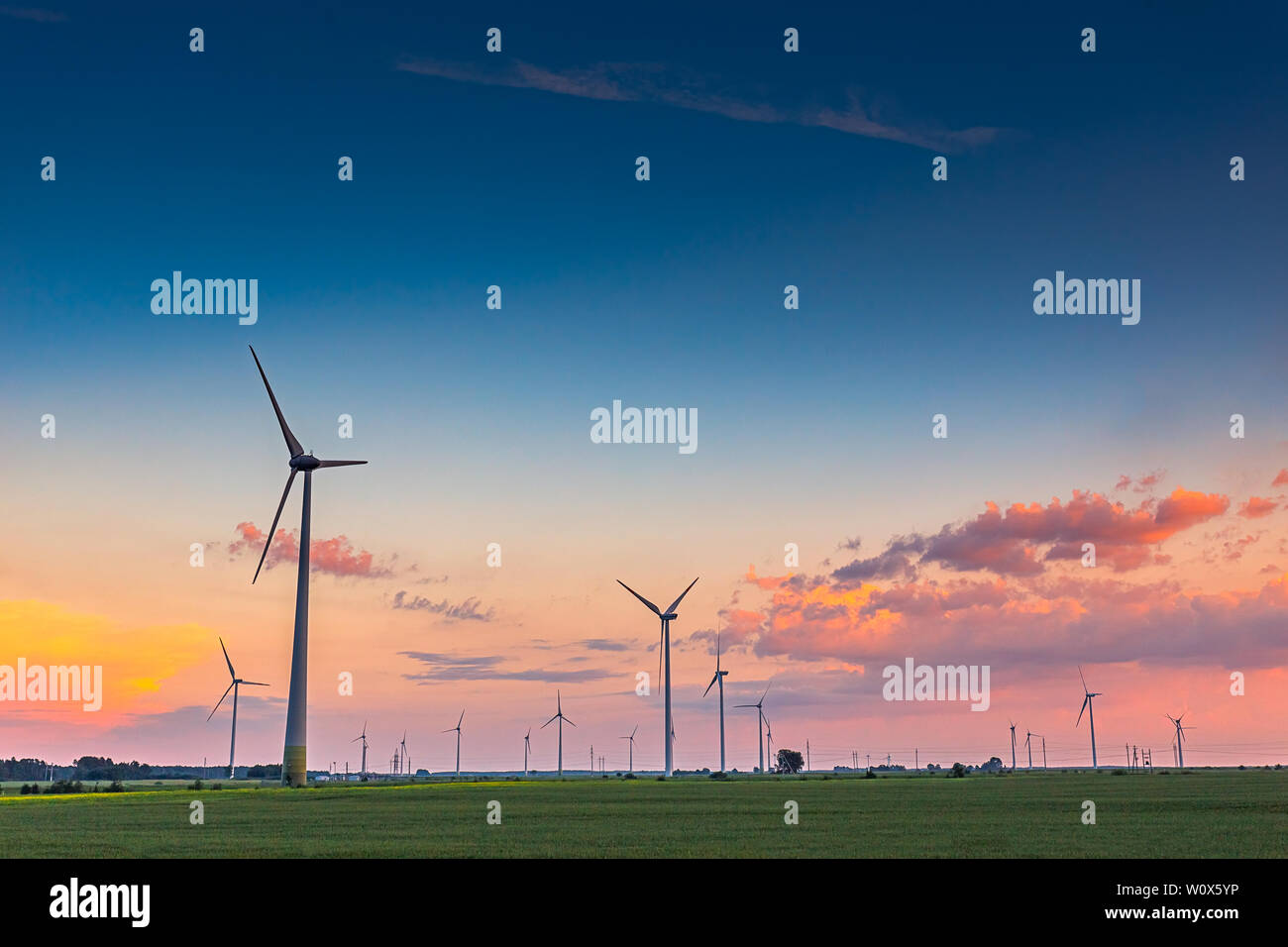 Wind turbines in the beautiful evening light Stock Photo - Alamy