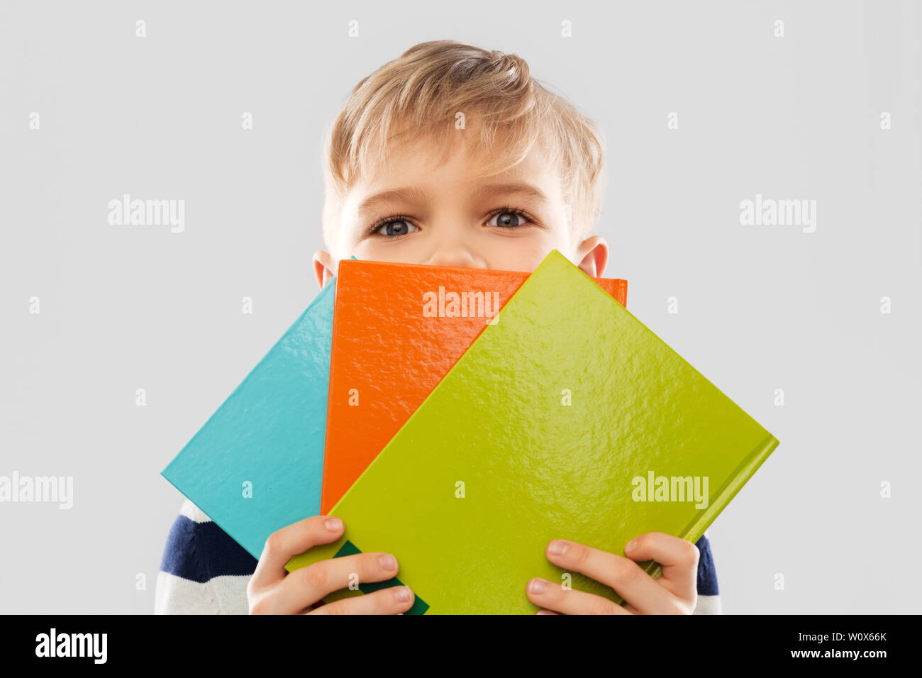 School kid hiding copy hi-res stock photography and images - Alamy