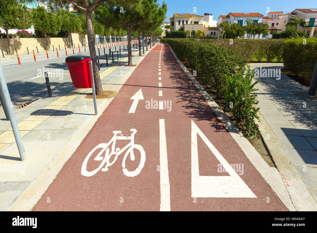 Bicycle lane signage on street Stock Photo - Alamy