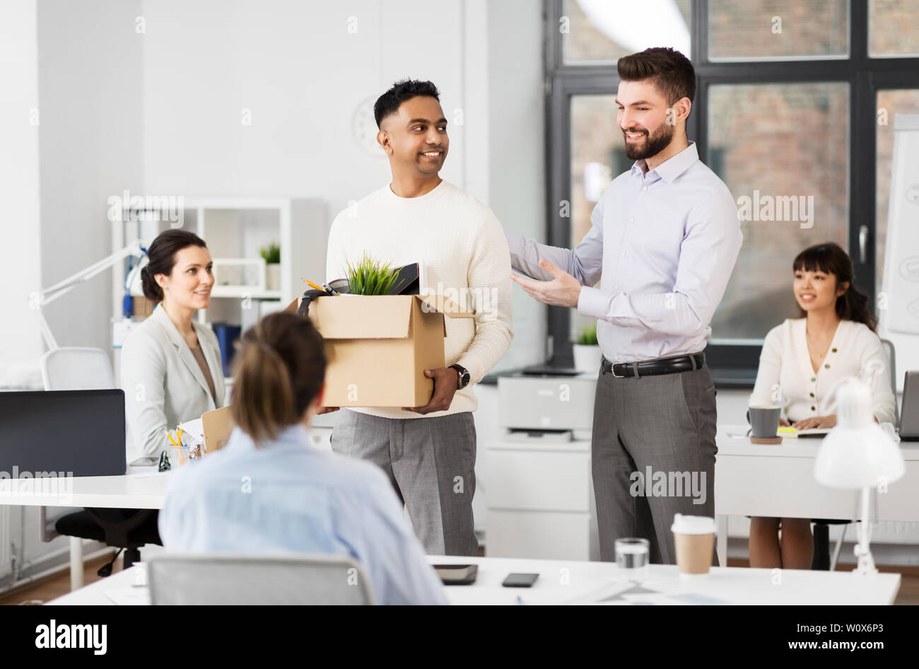 Business man introducing new employee hi-res stock photography and ...
