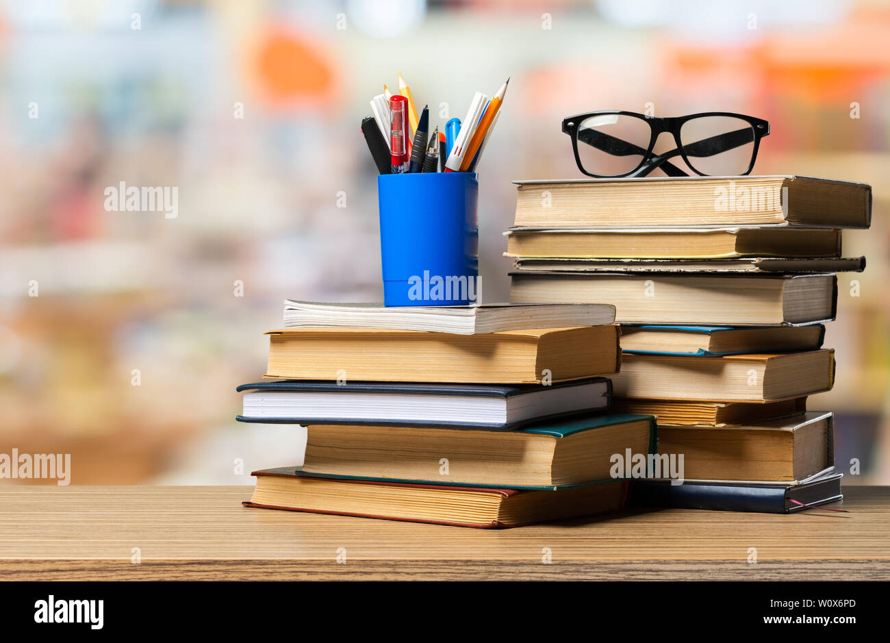Books on the table Stock Photo - Alamy