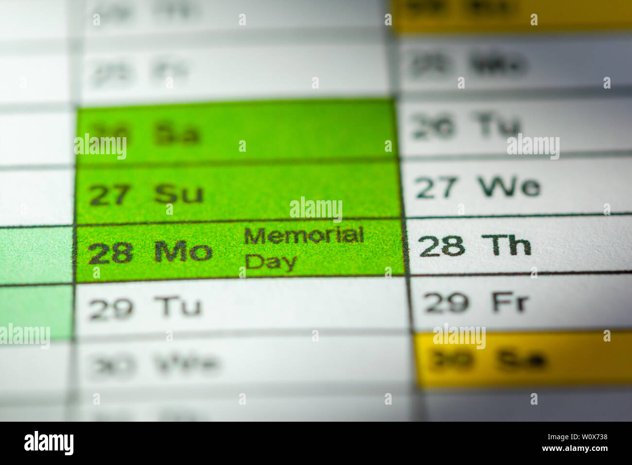 Closeup of dates on calendar page Stock Photo - Alamy