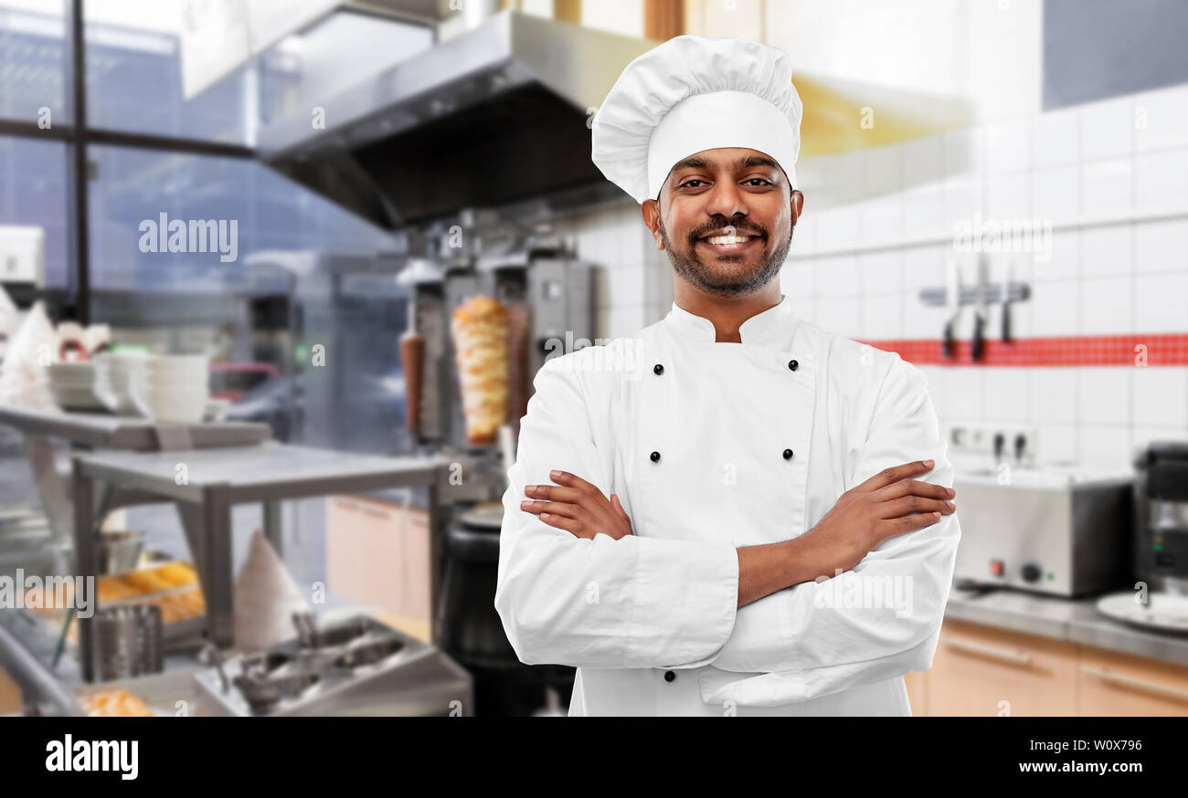 happy male indian chef in toque at kebab shop Stock Photo - Alamy