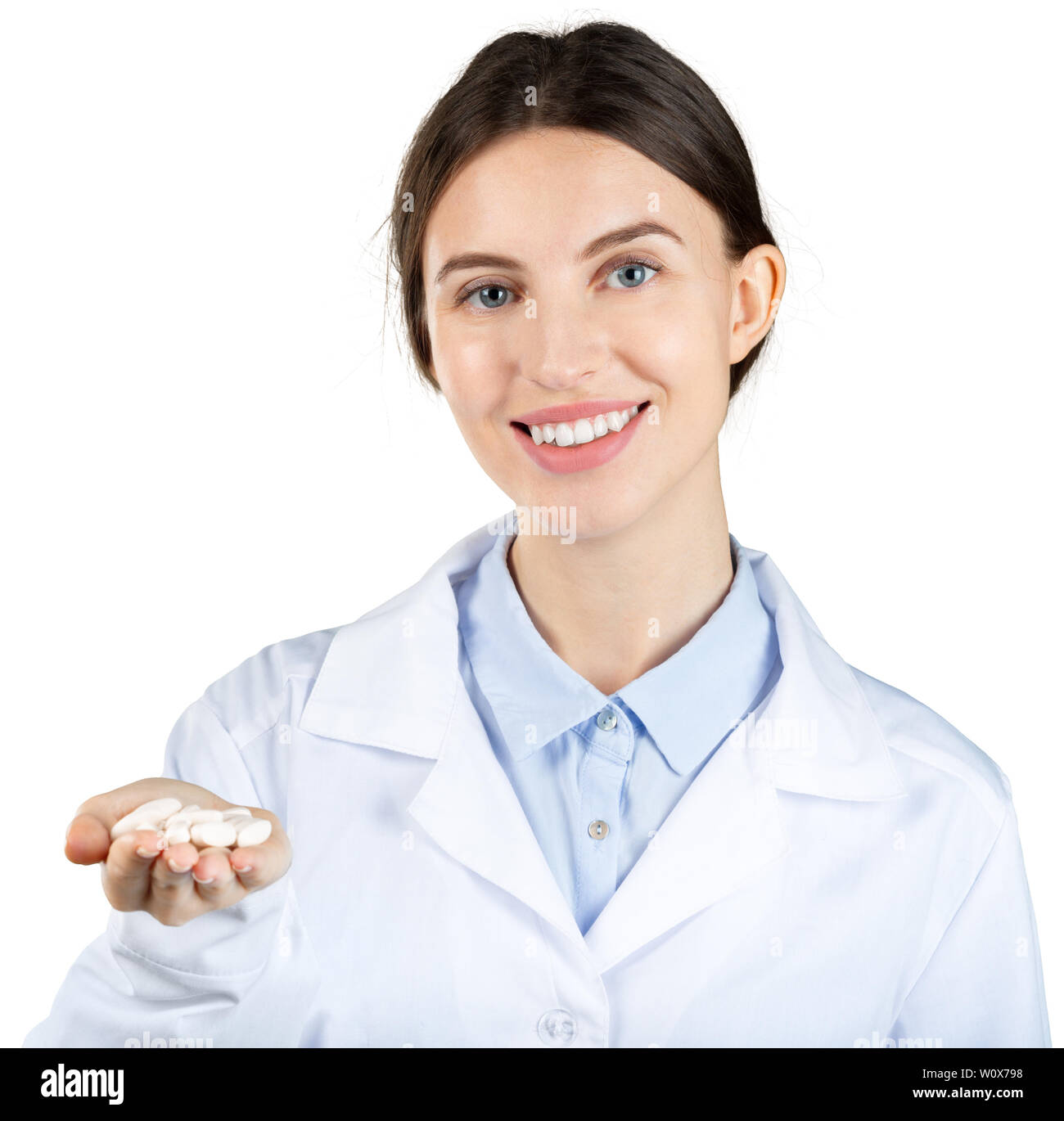 Young woman doctor making presentation of a medicine isolated on white ...