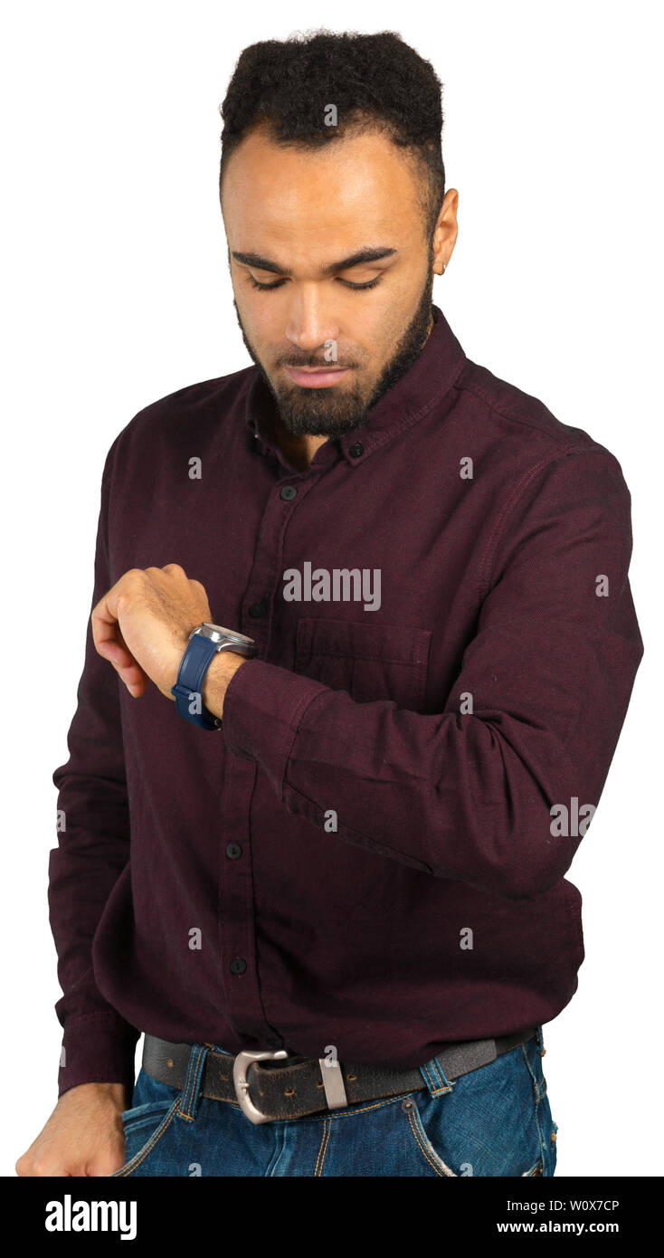 Young black man putting his watch on his arm isolated on white ...