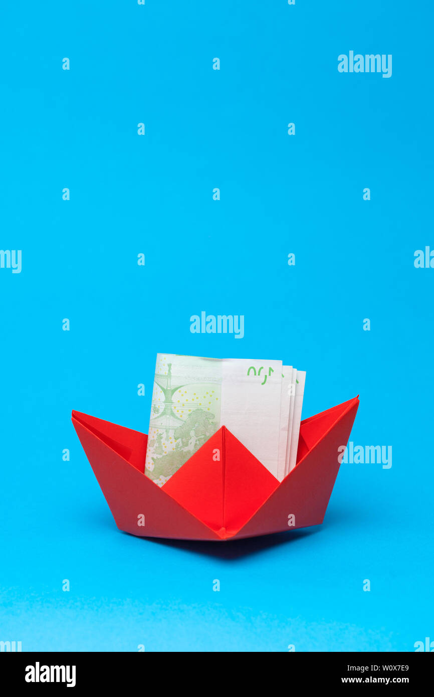 Money banknotes paper boats hi-res stock photography and images - Alamy