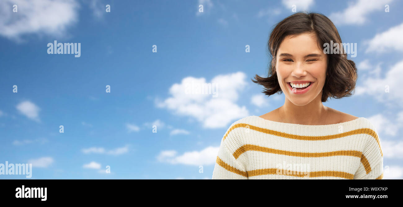 Woman winking smiling hi-res stock photography and images - Alamy