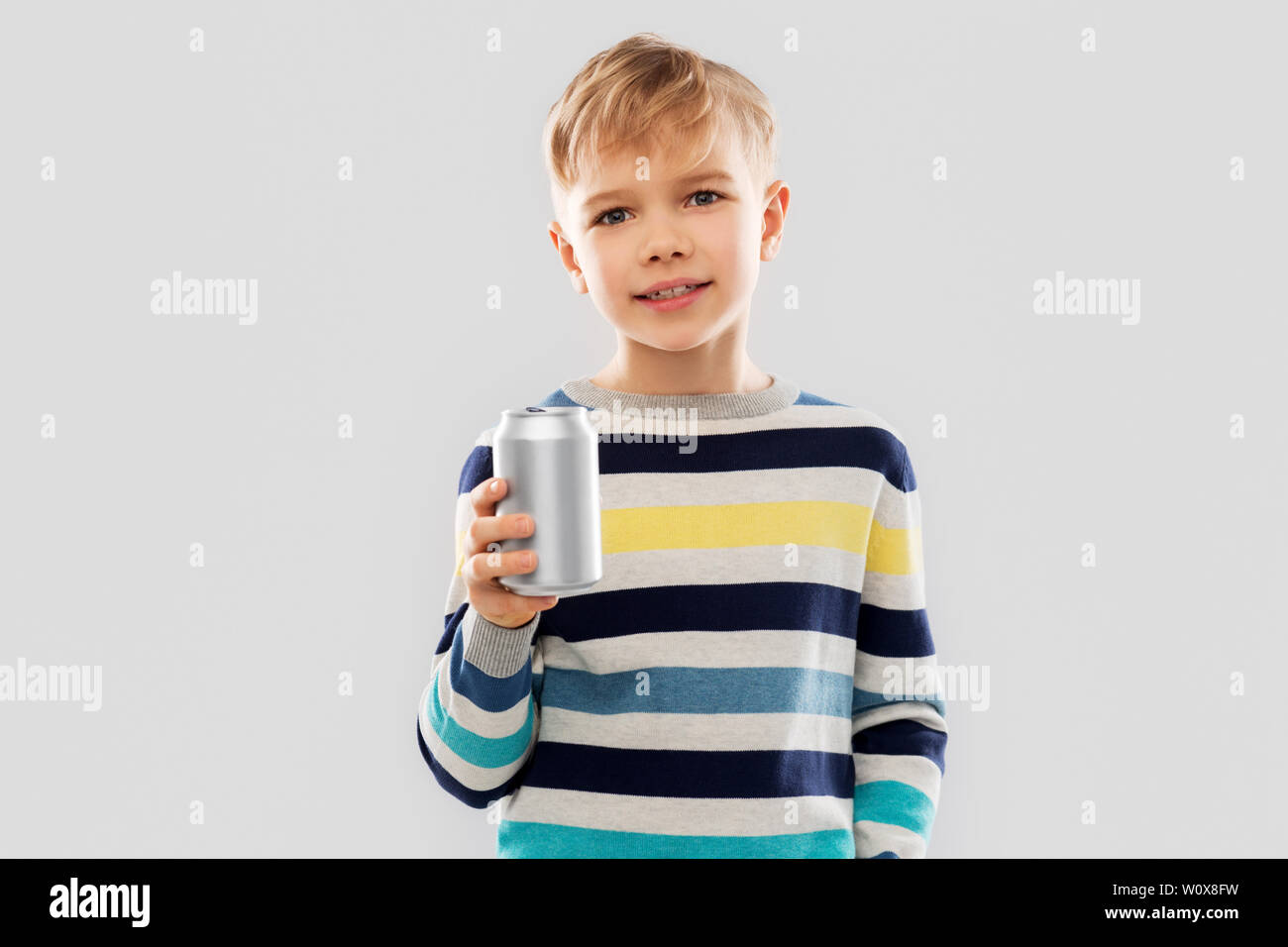 portrait of little boy with soda can drink Stock Photo - Alamy